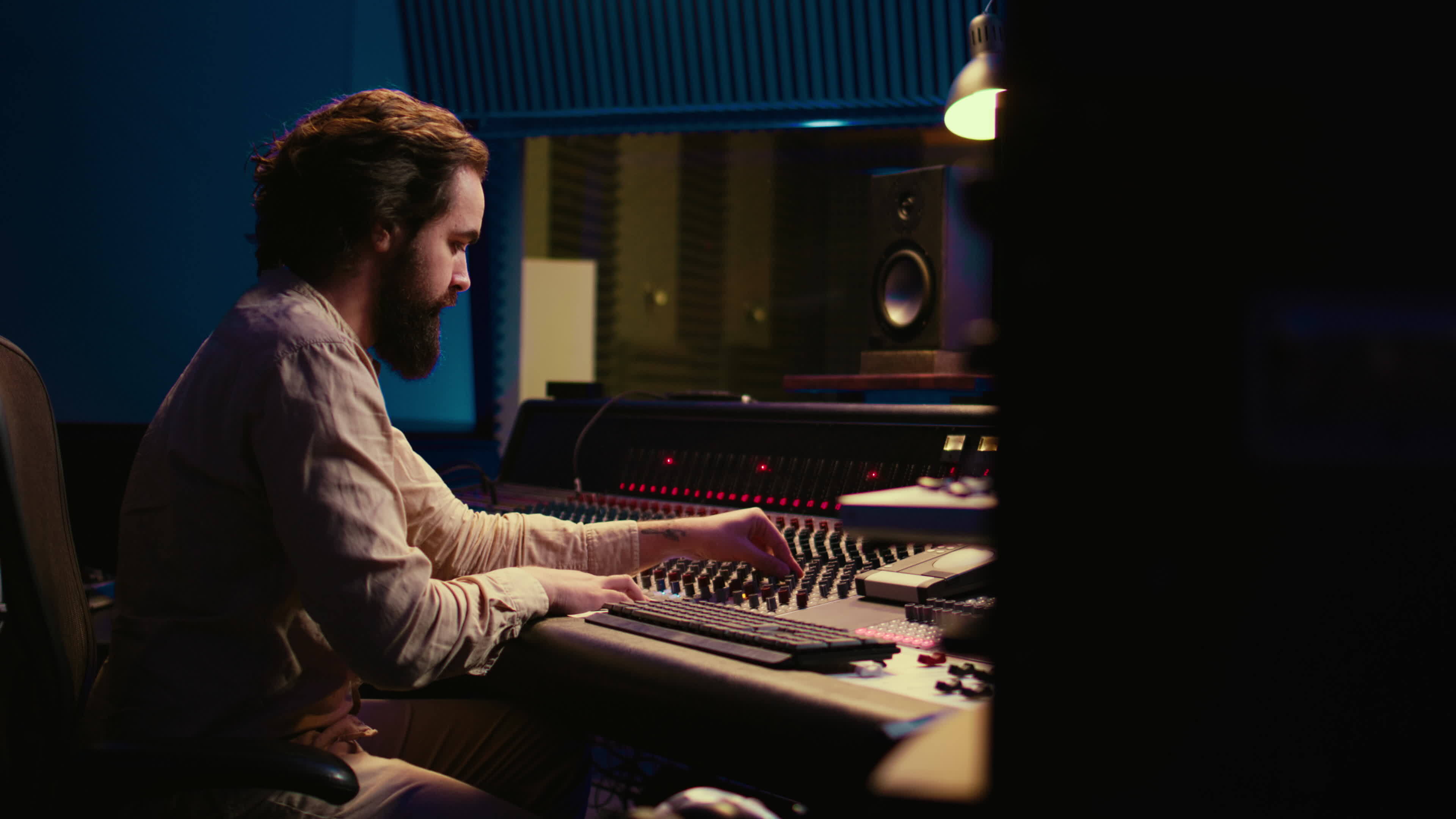 Portrait Of Sound Engineer Recording Audio And Editing With Mixing