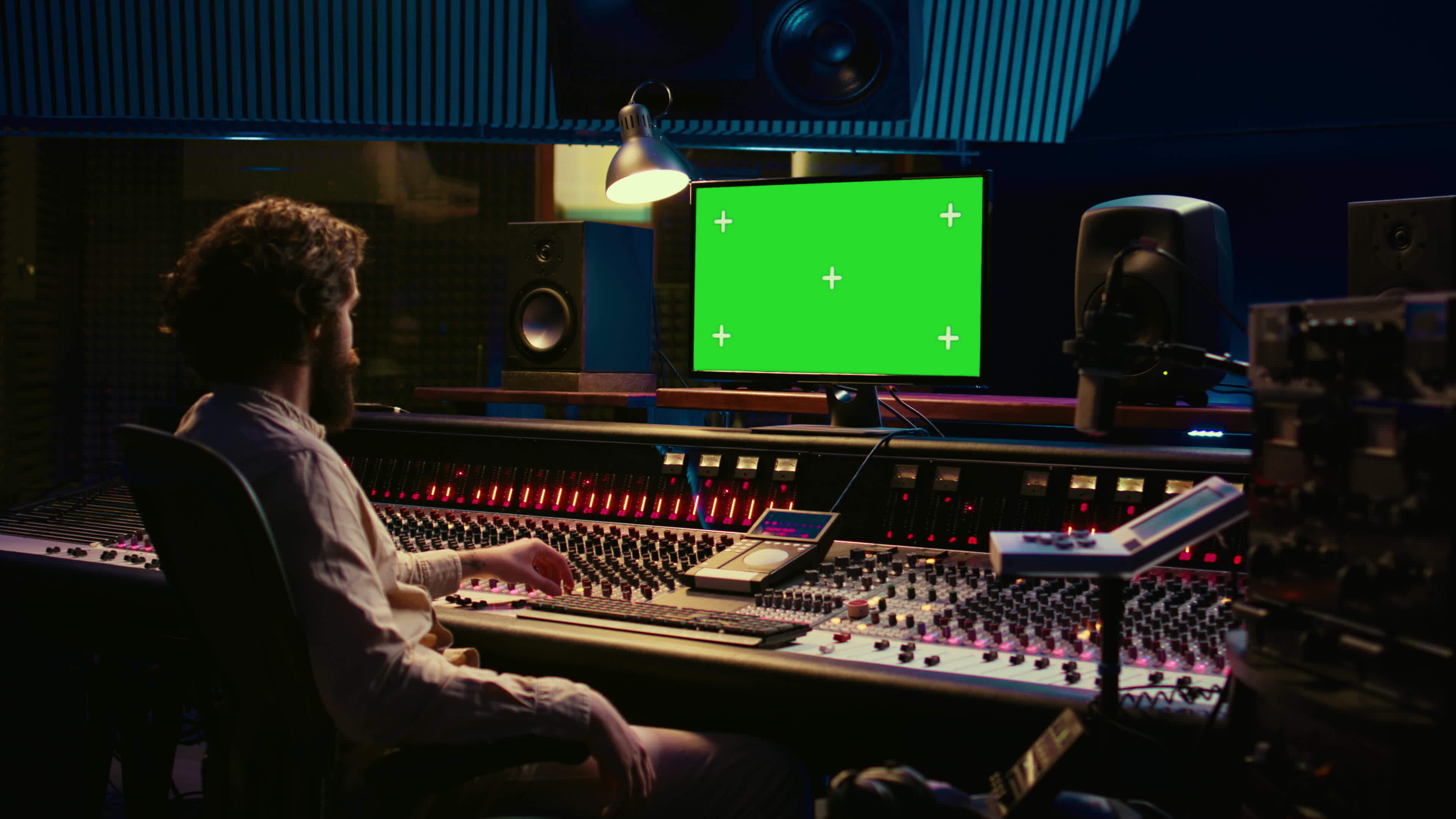 Tracking Engineer Watching Tutorials Online To Learn Mixing And