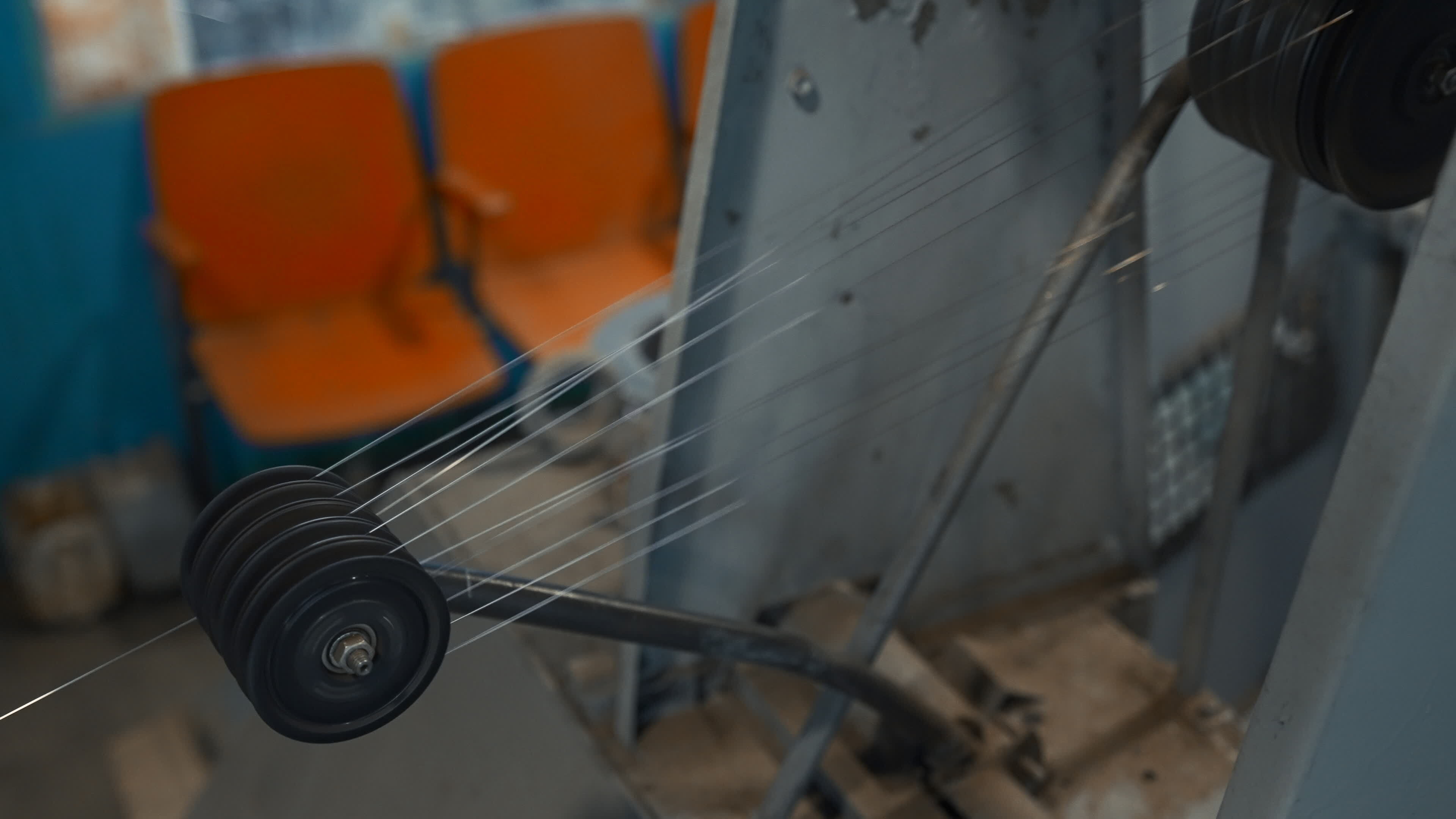 Metal threads rotate on industrial machine. Creative. Rotating shafts ...