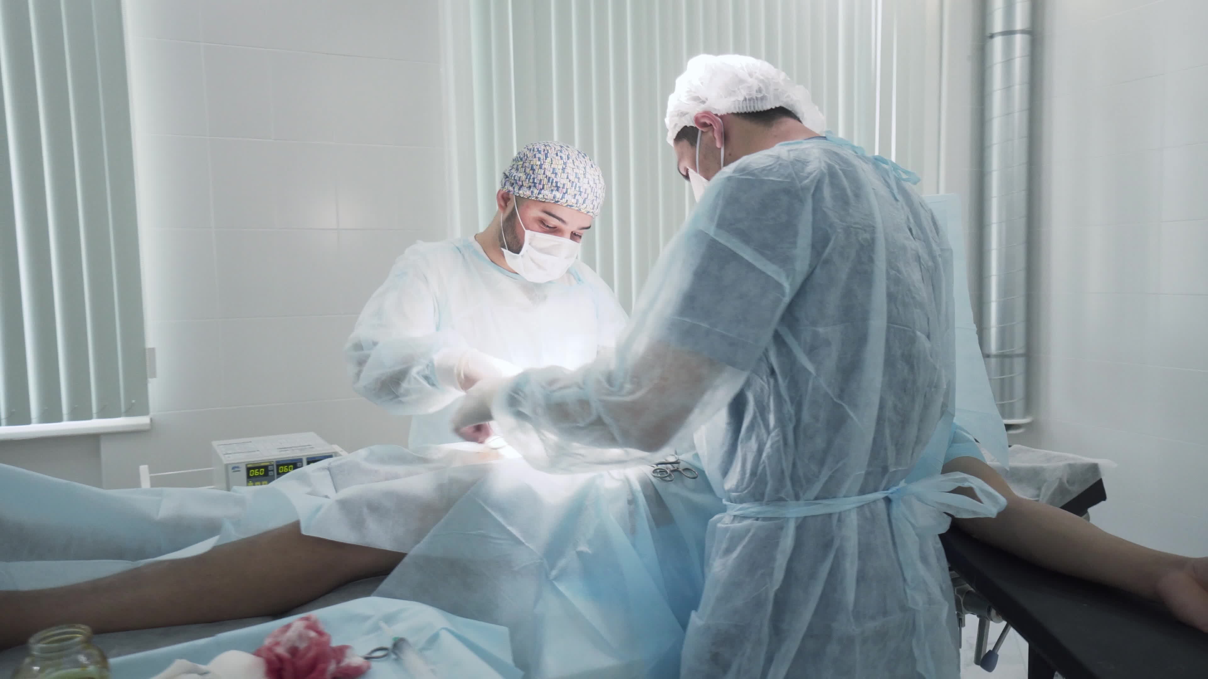 Surgeons perform operation under anesthesia. Action. Two professional ... Surgeons perform operation under anesthesia. Action. Two professional ...