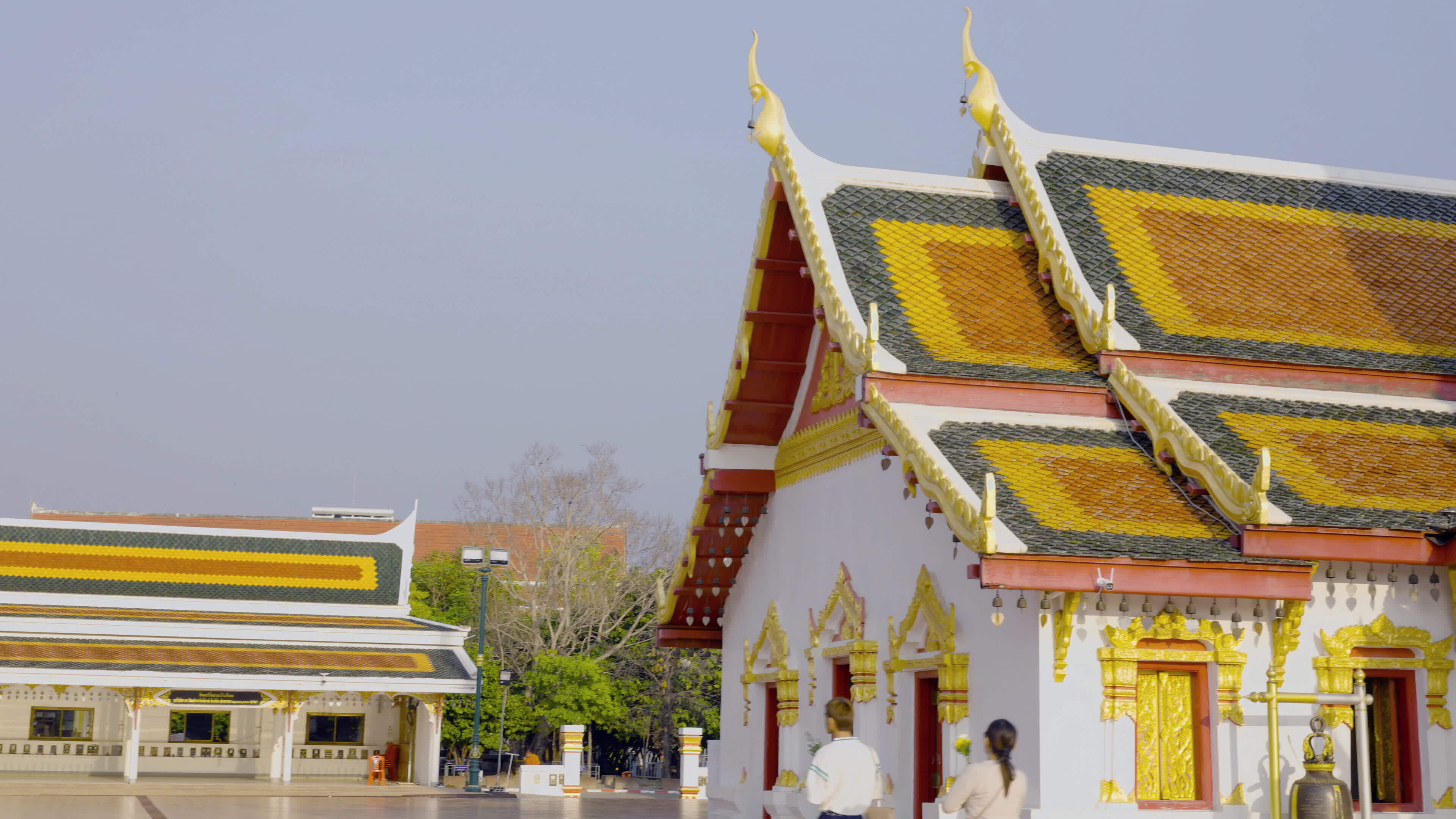 Tourists Visit and pay homage to Wat Phra That Choeng Chum Worawihan Mueang Sakon Nakhon ...