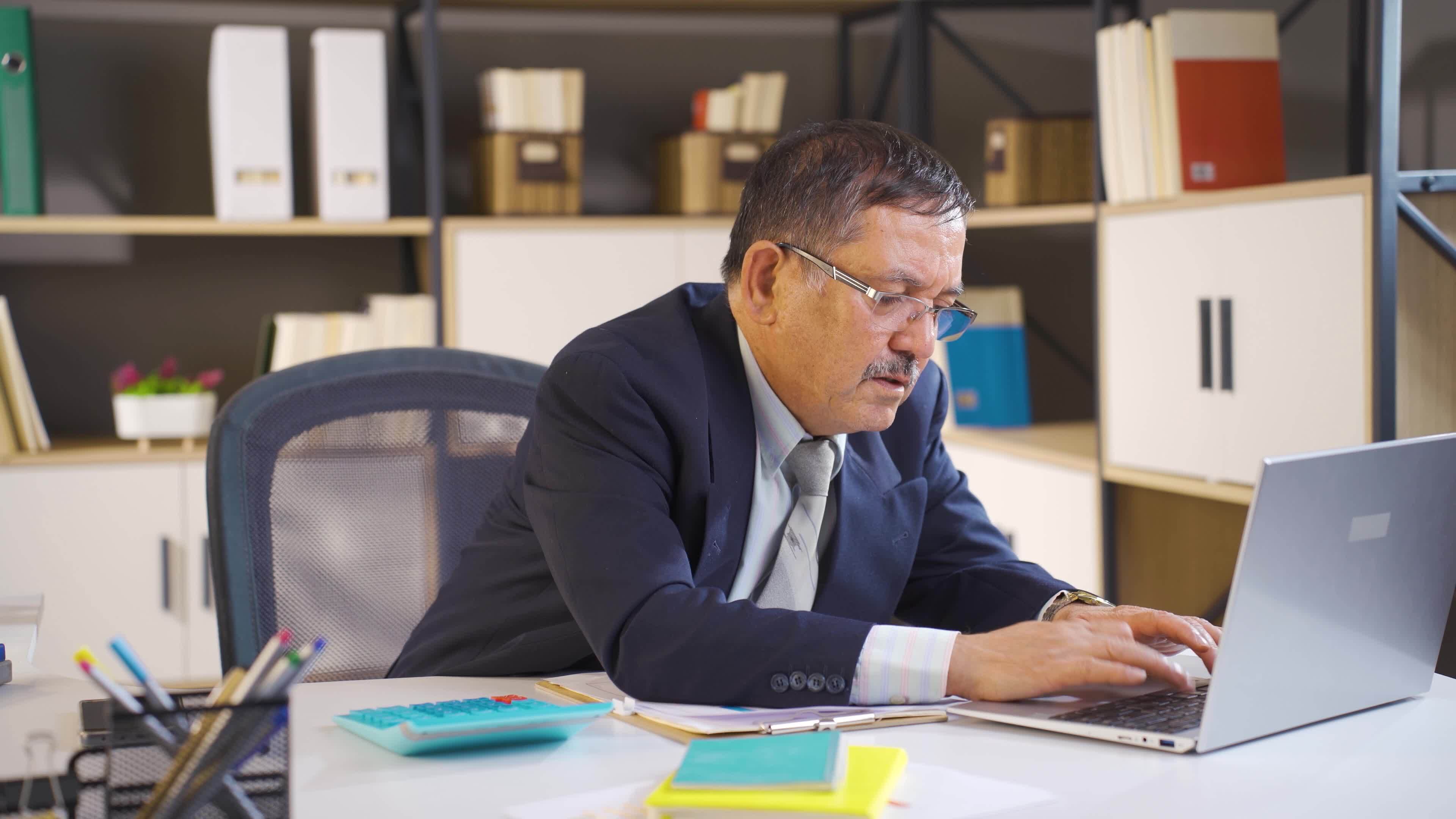 Frustrated businessman on laptop. 42574587 Stock Video at Vecteezy