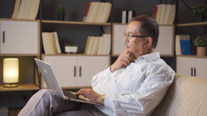 Old Man Using Computer Stock Video Footage for Free Download