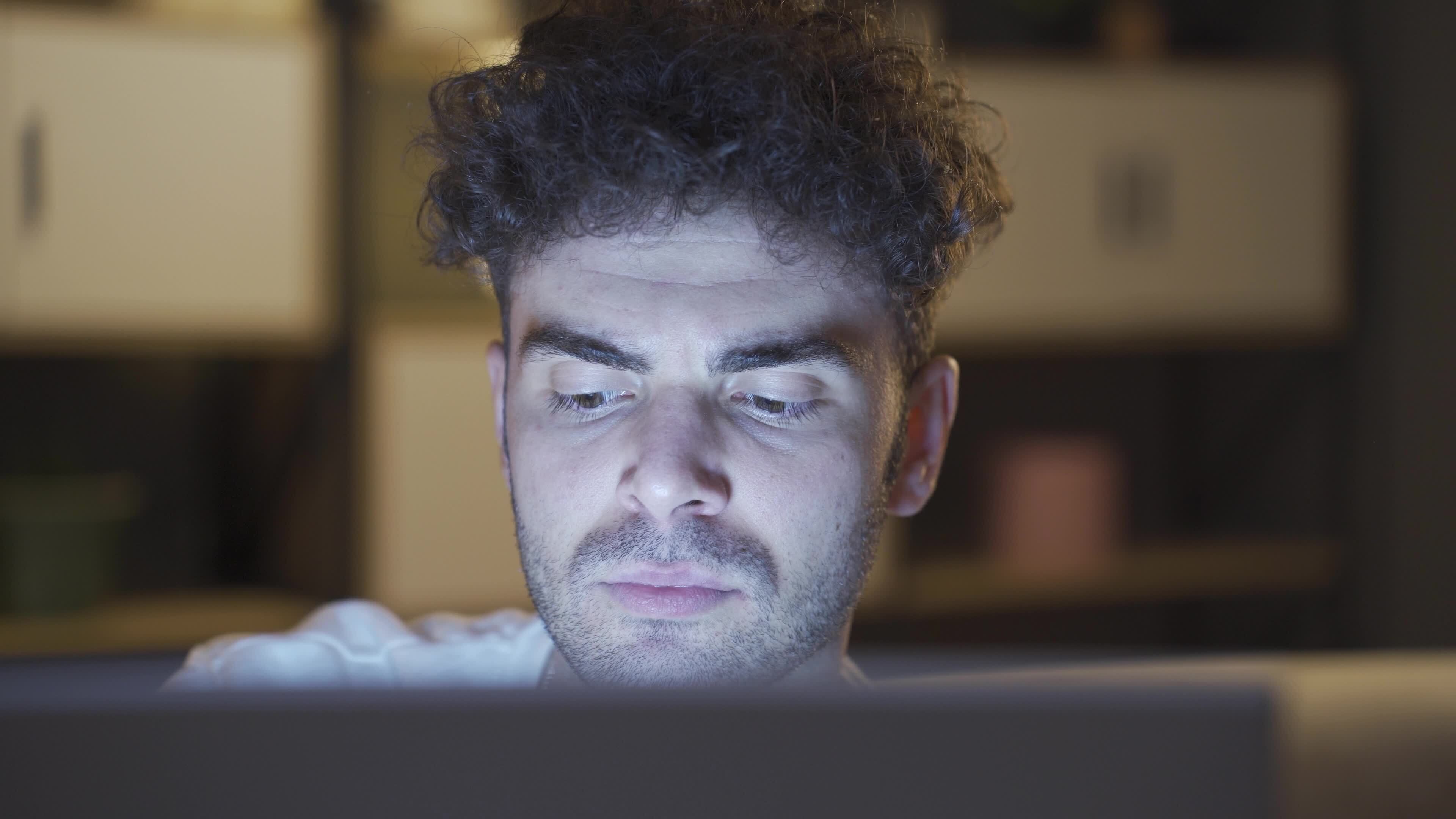 Close-up young man using laptop. 42574777 Stock Video at Vecteezy