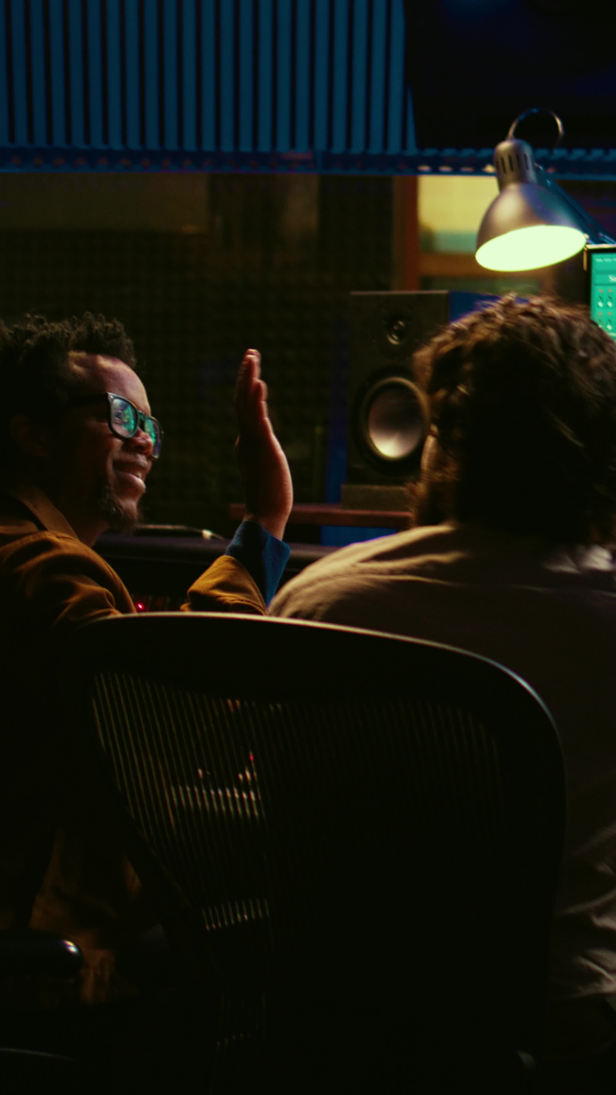 Vertical Diverse Team Of Artist And Sound Designer Working On Editing