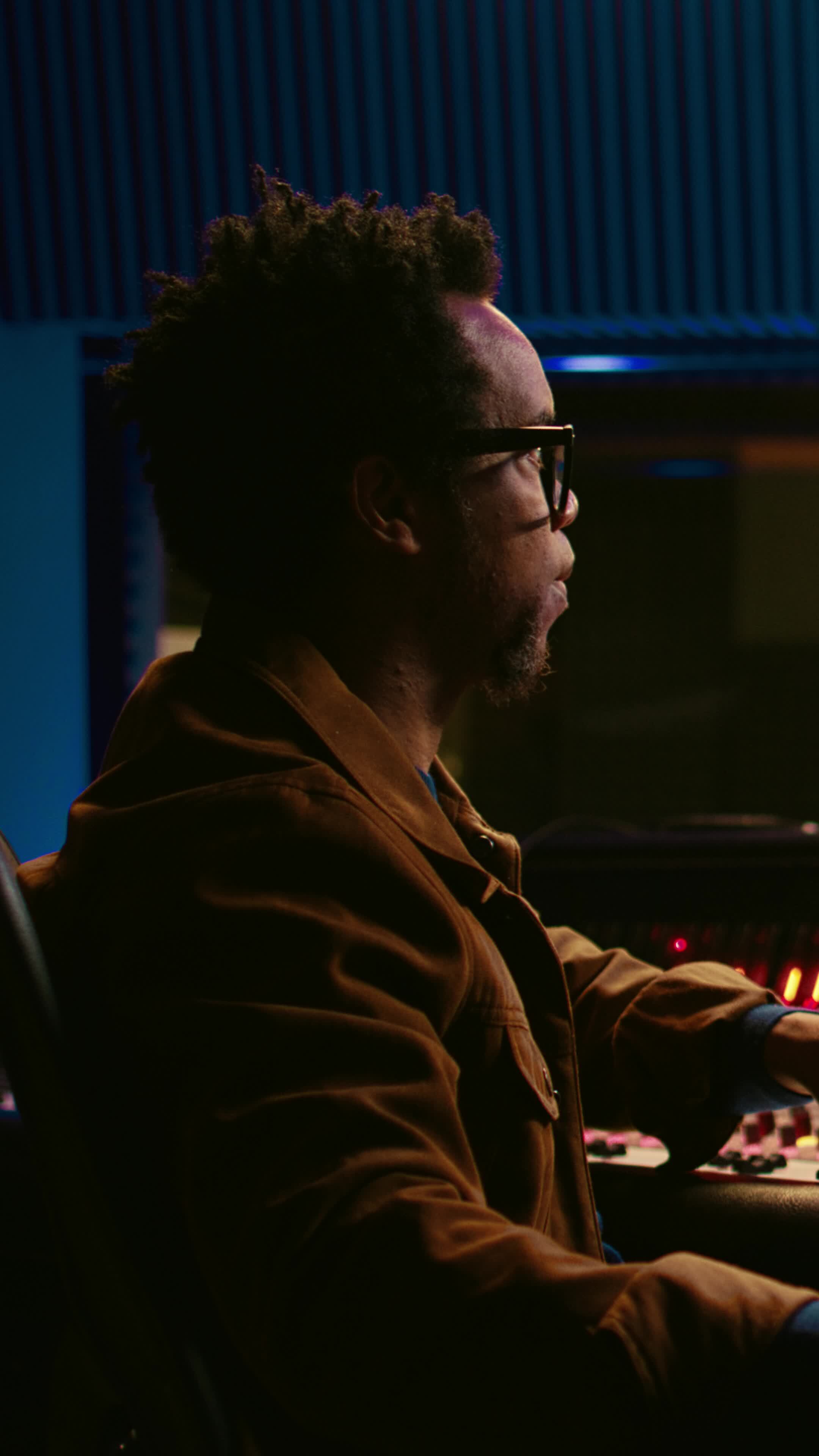 Vertical African American Sound Designer Working With Editing Software