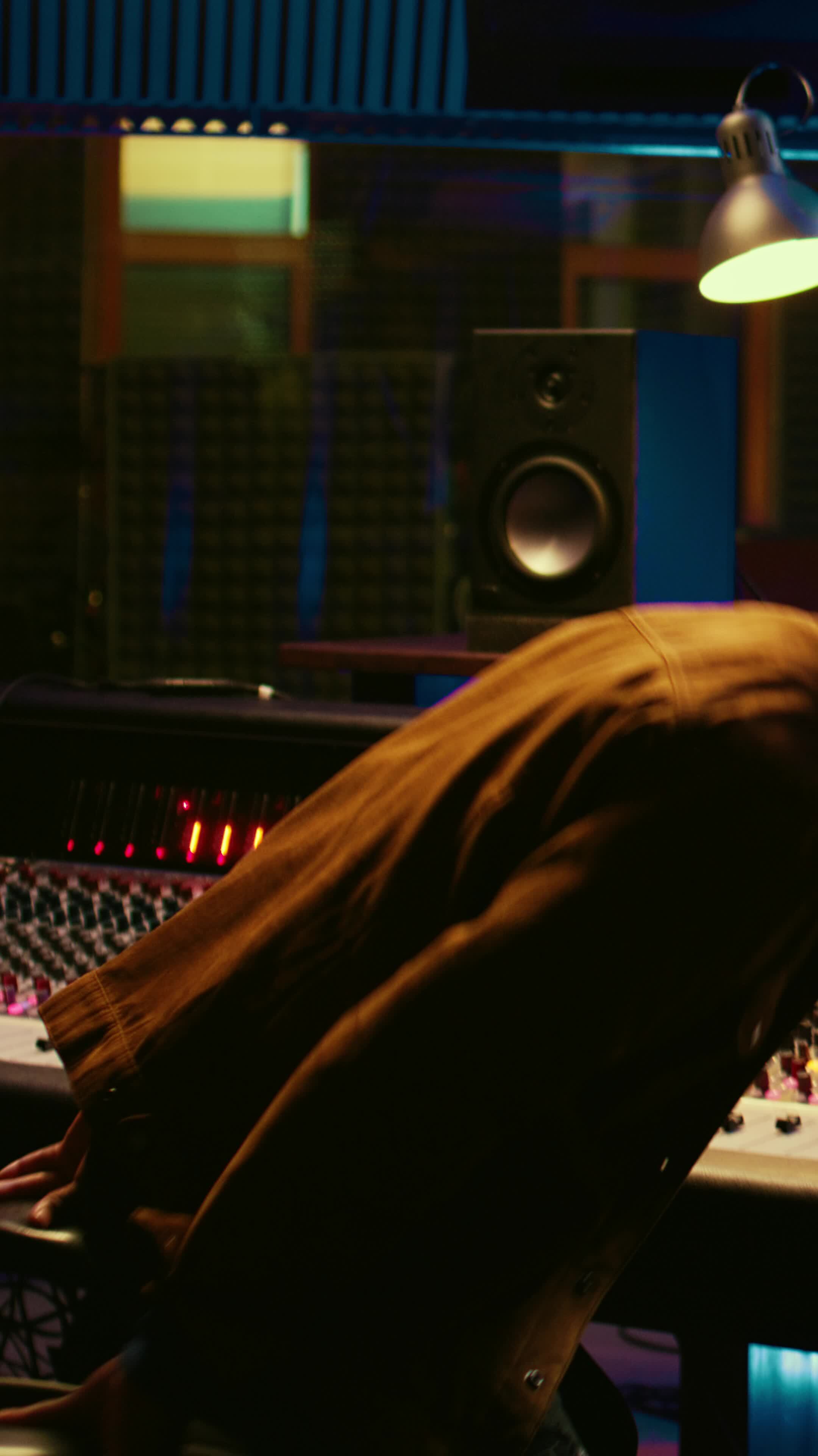Vertical Tracking Engineer Working On A New Album And Recording Hit