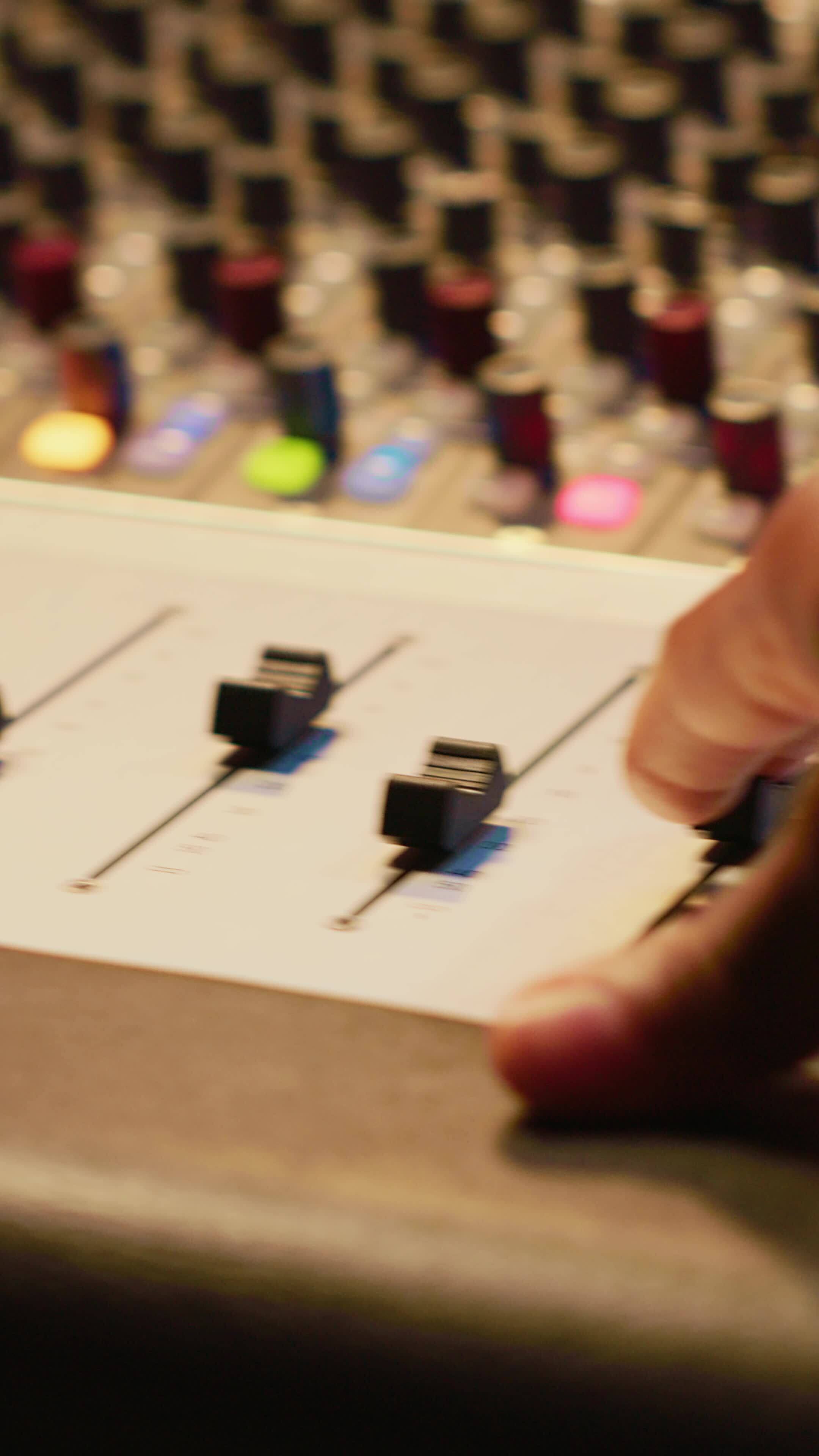 Vertical Artist composer creating a new song on his electro guitar in studio, recording tracks ...