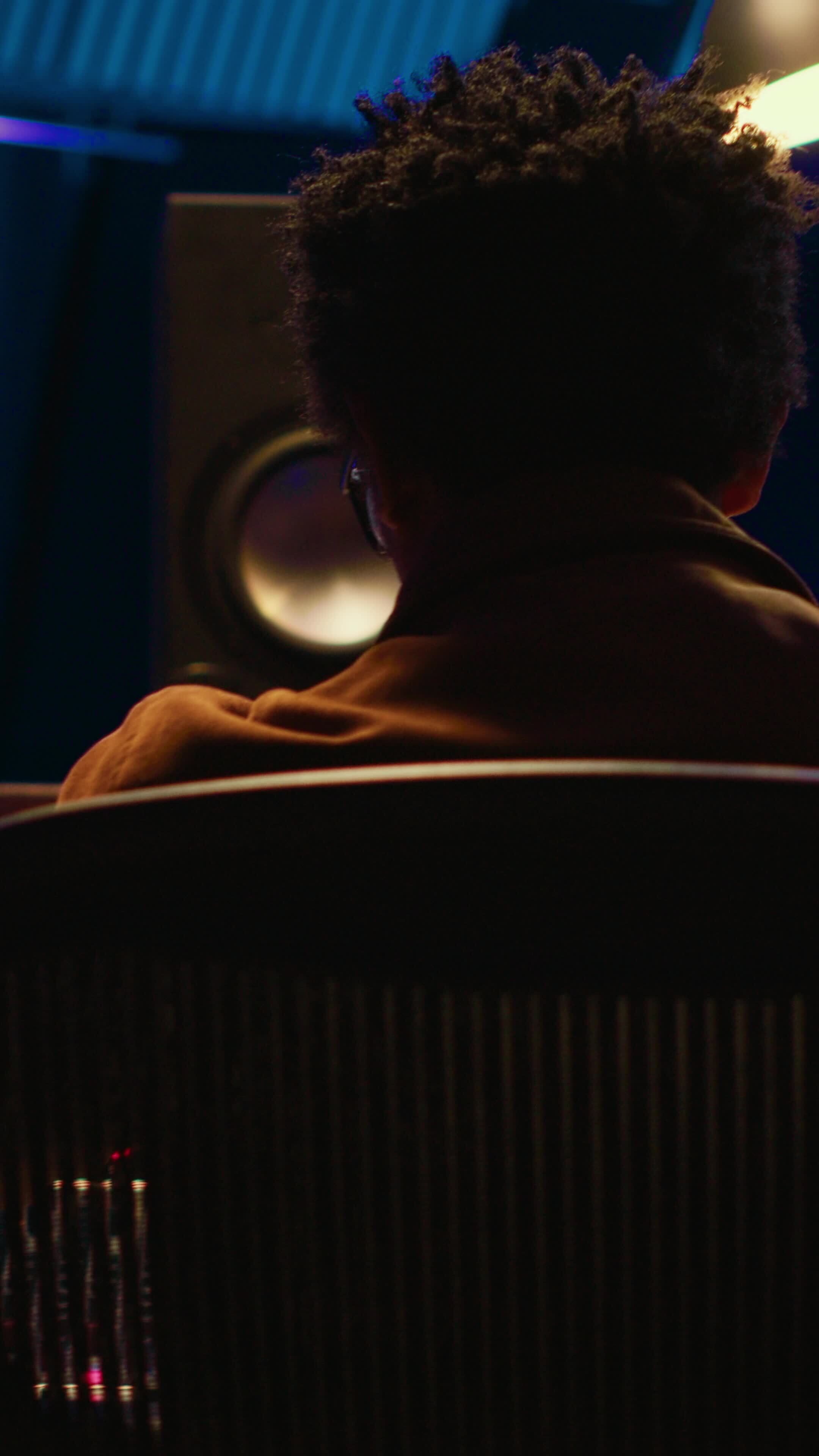 Vertical Team Of Artist And Technician Editing Audio After Recording