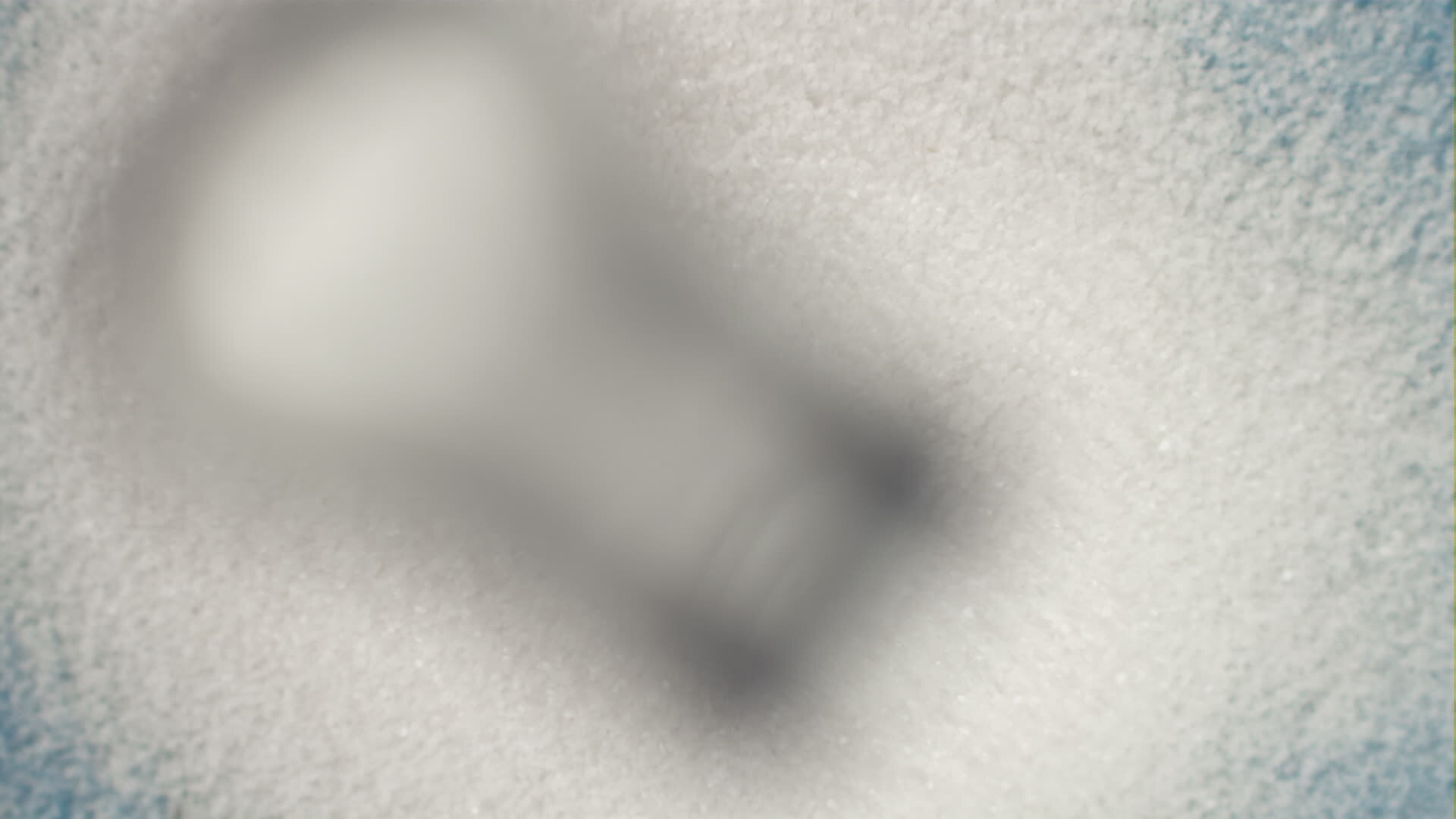 Super slow motion drop the salt shake in the pile, view from above. Filmed on a high-speed ...