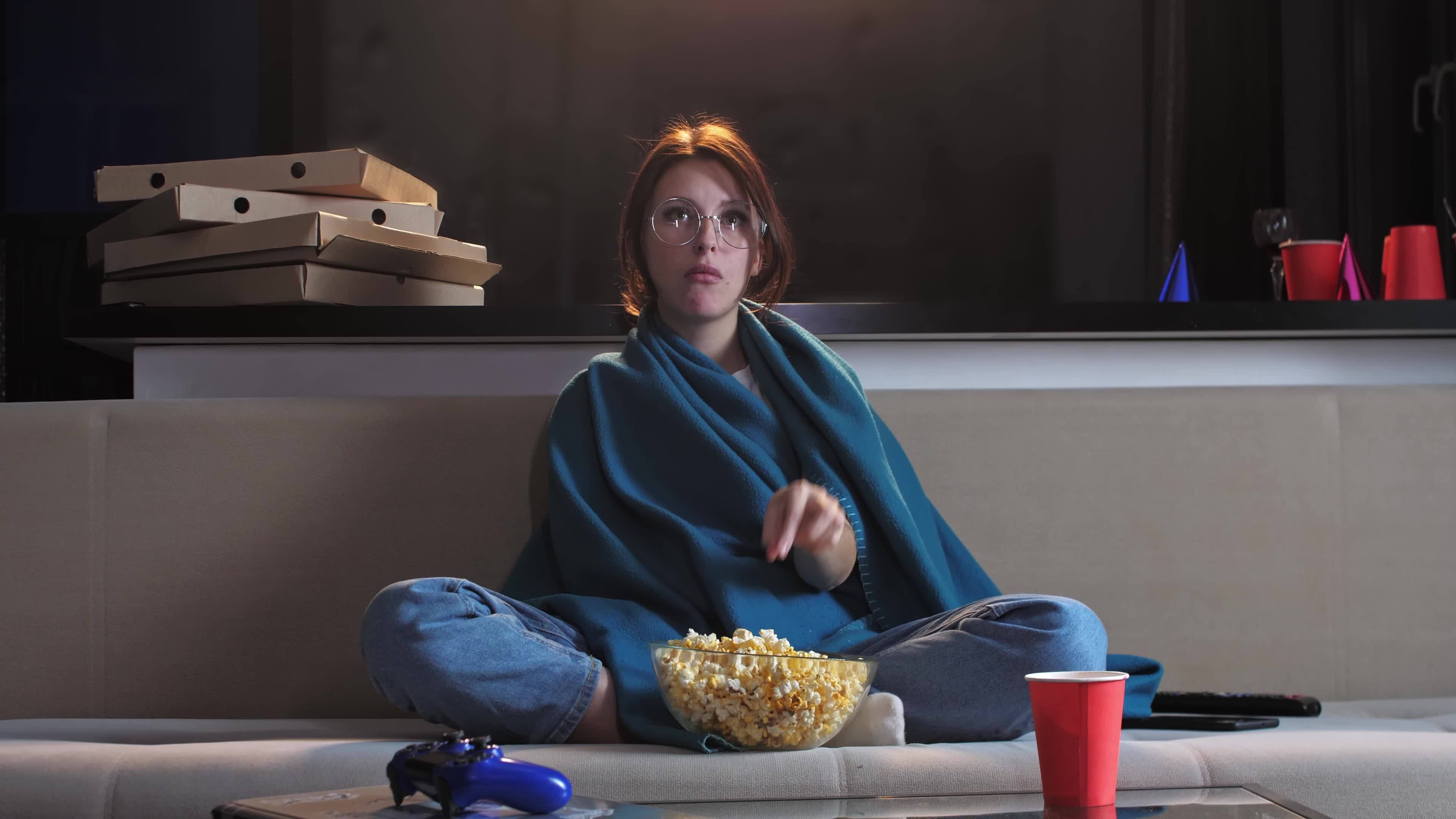 A young woman is enjoying her vacation after meeting with friends. She ...