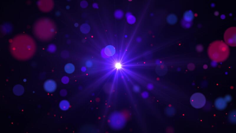 4k Abstract loop bokeh background with light particles on a dark background. Animation footage ...