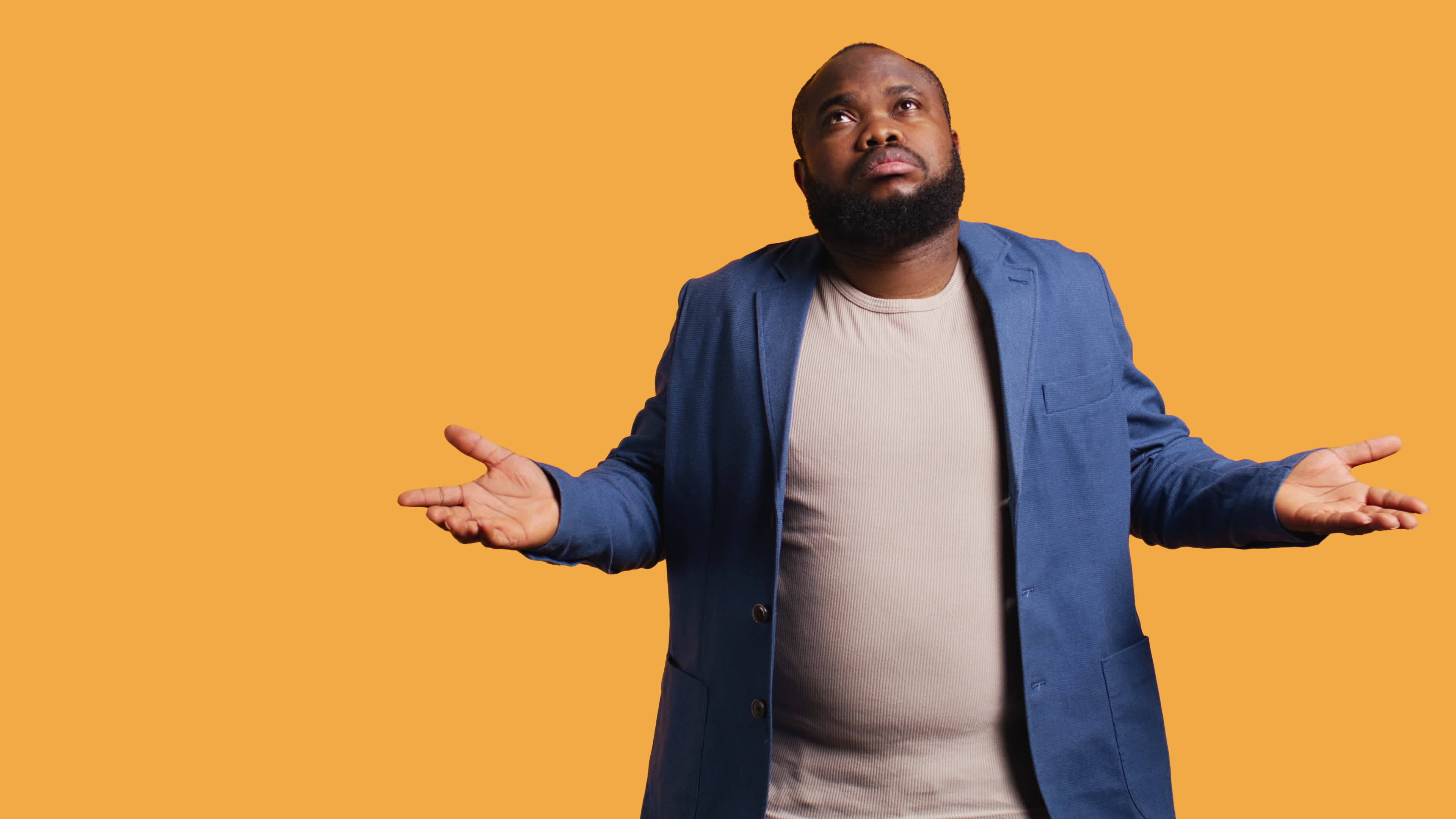 African american man shrugging shoulders, not caring, having detached ...