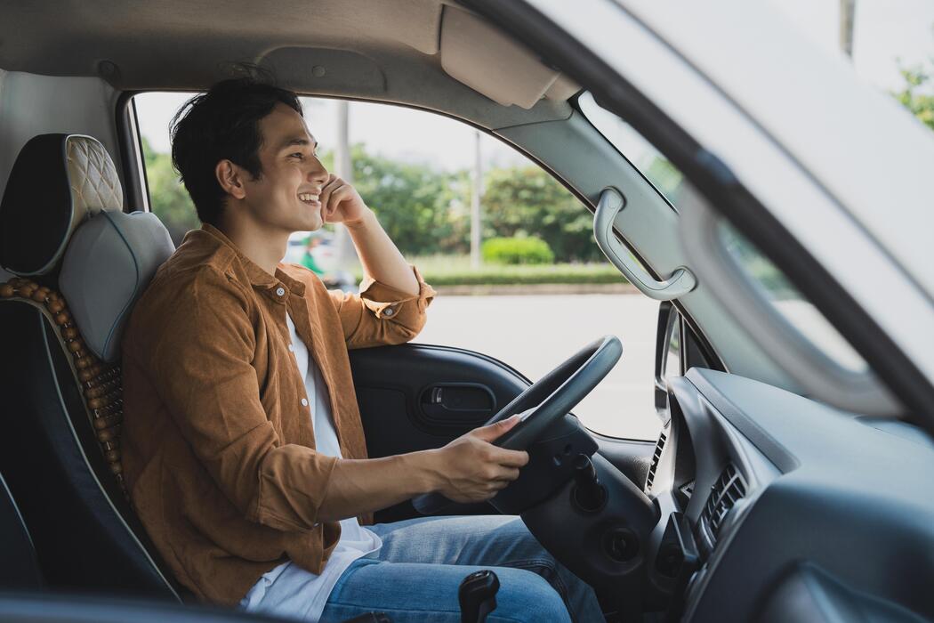 Asian Man Driving Stock Photos, Images and Backgrounds for Free Download