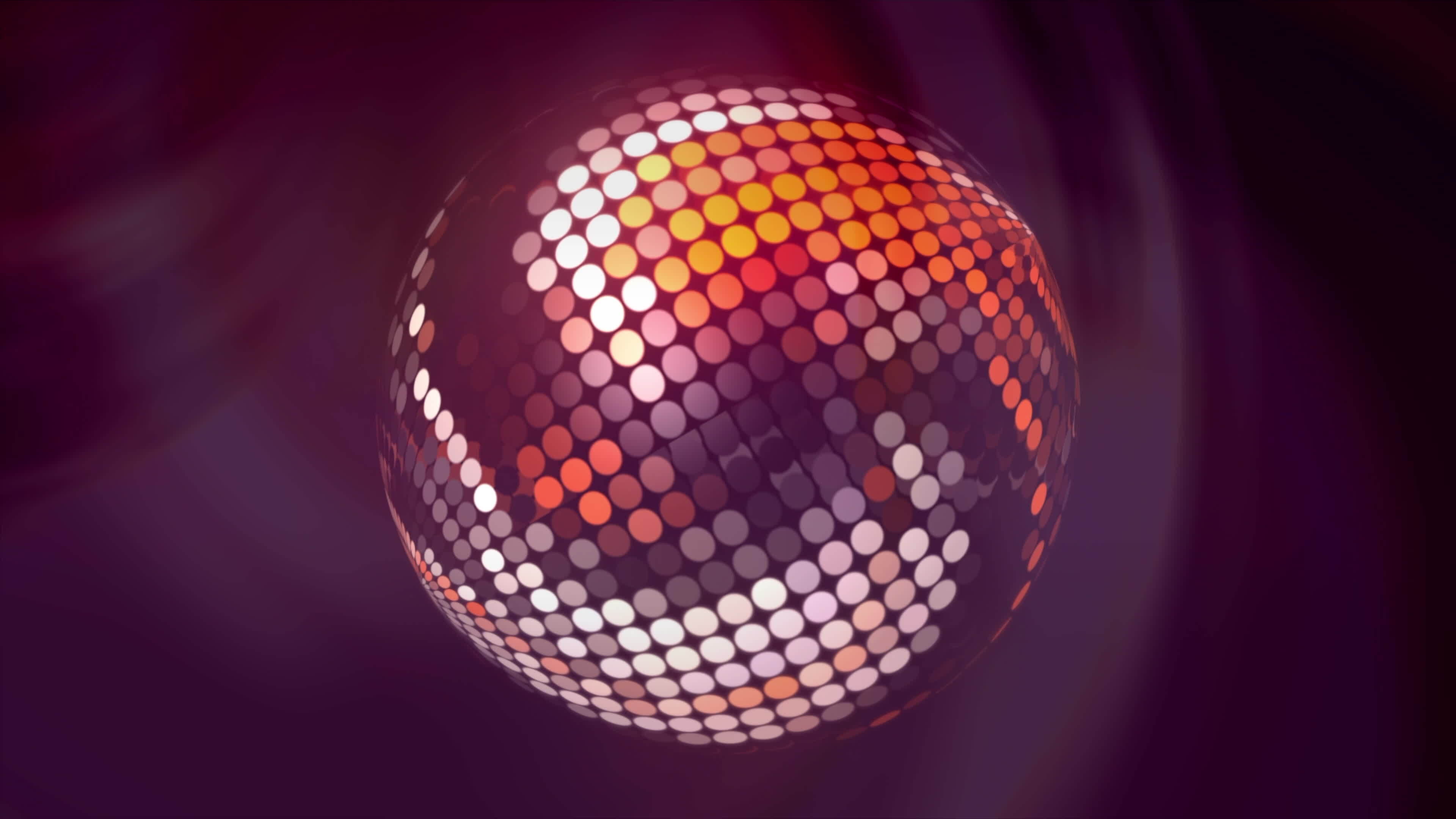 Rotating disco ball with spiral. Motion. Colorful hologram on disco ball with radiation. Bright ...