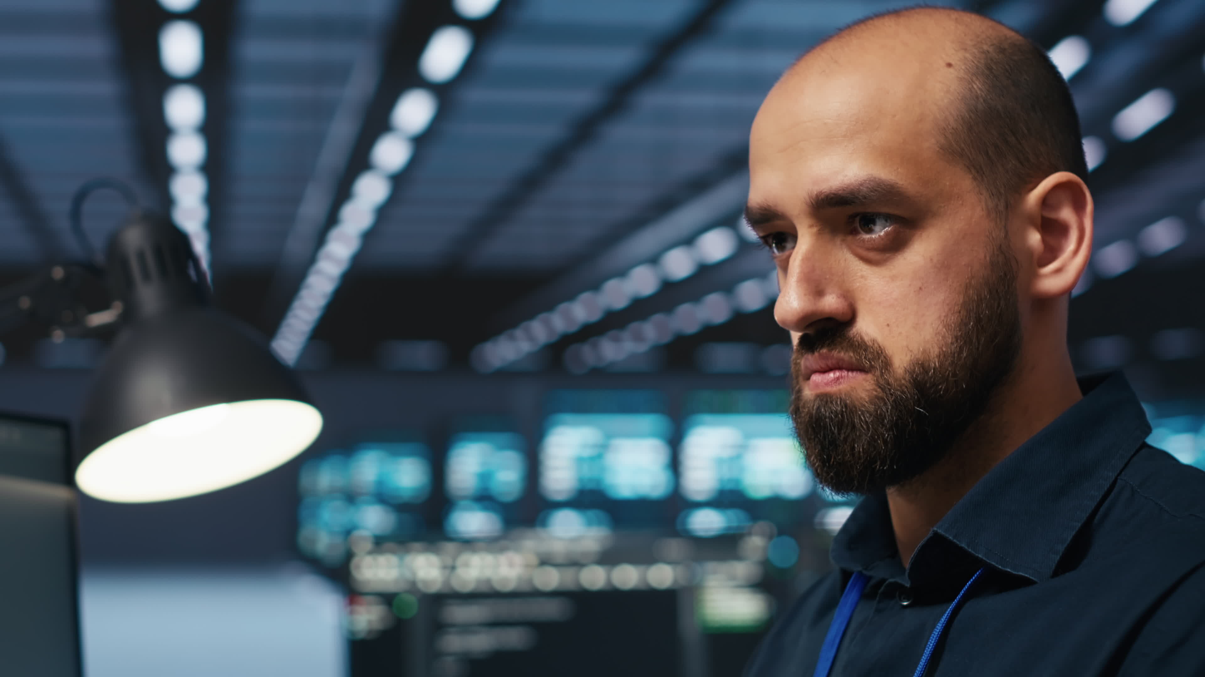 Close Up On Programmer In Server Farm Safeguarding Data From Intruding Hackers Developer