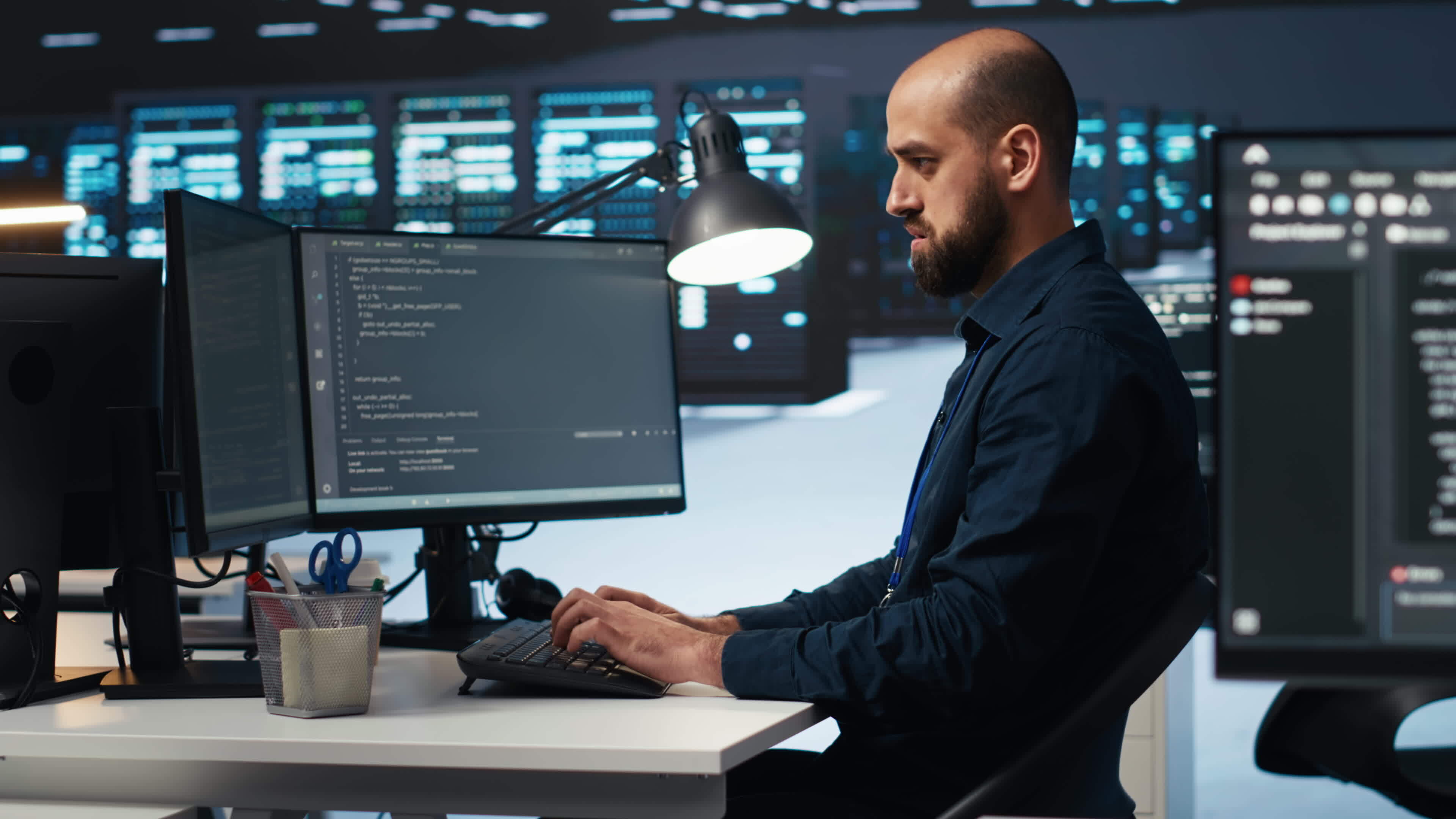 It Specialist In Server Farm Ensuring Valuable Data Remains Shielded