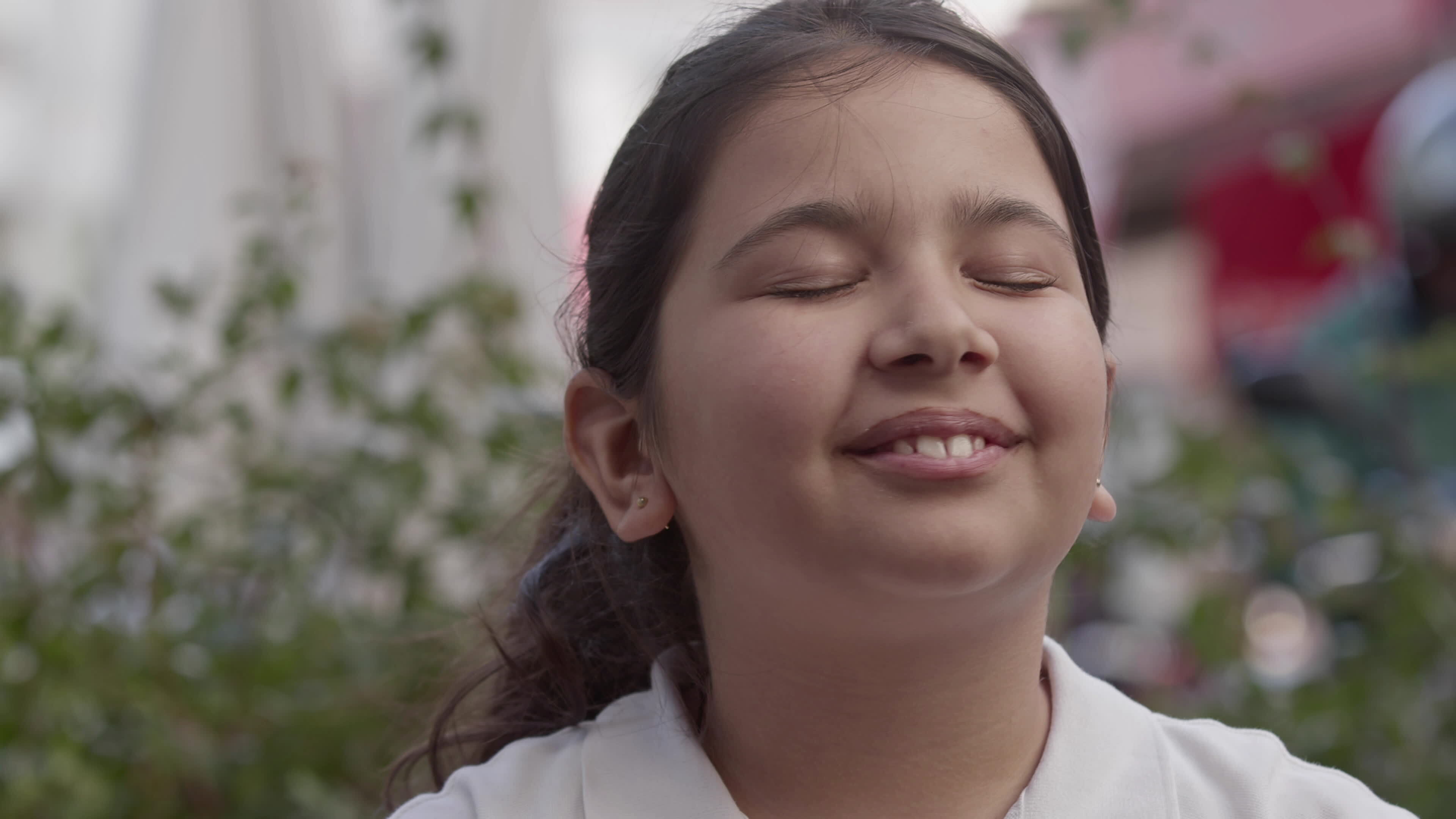 Innocent Cute Girl With Eyes Closed Looking At Camera Smiling Footage