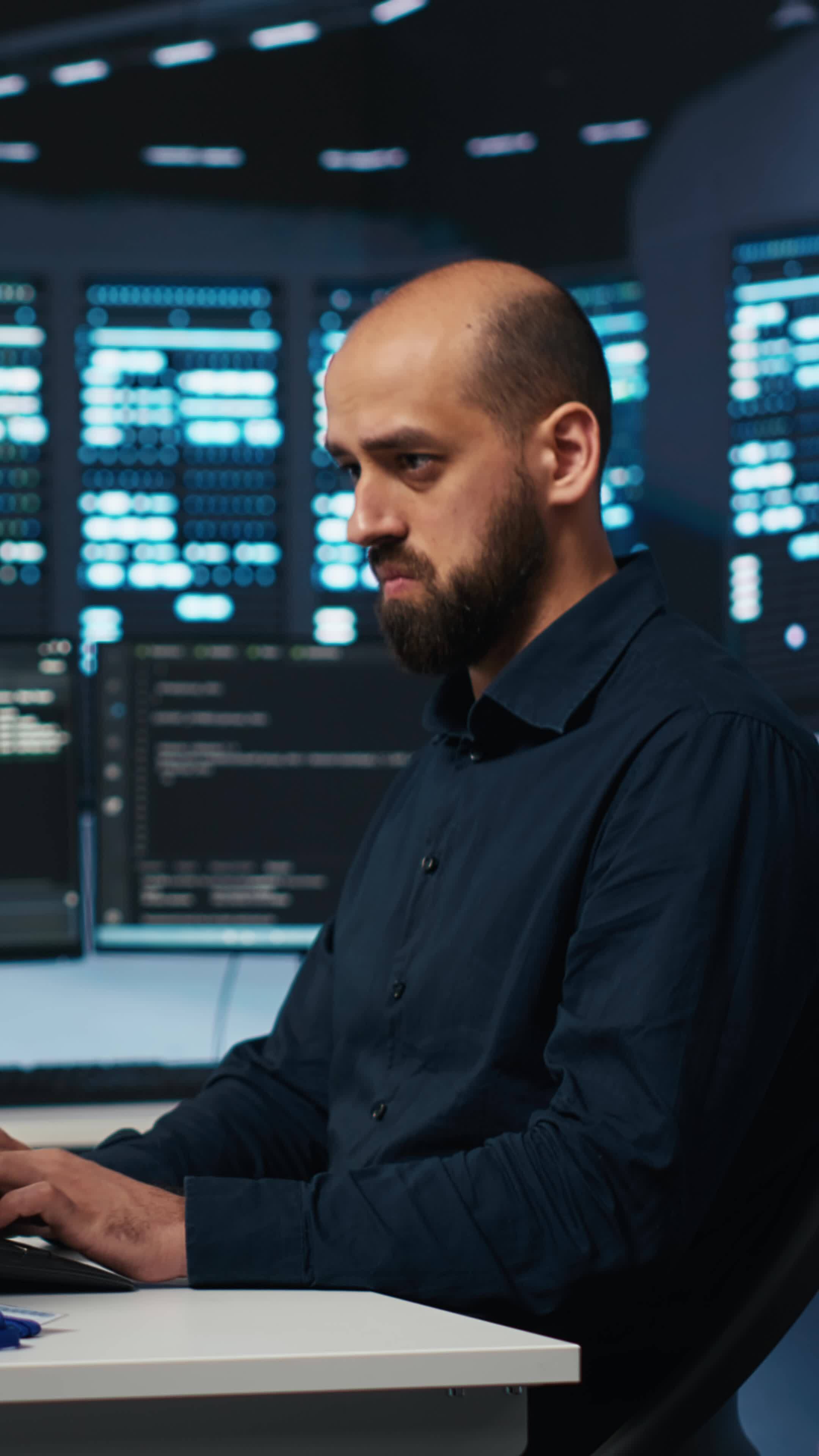 Vertical System administrator programming in server farm housing ...