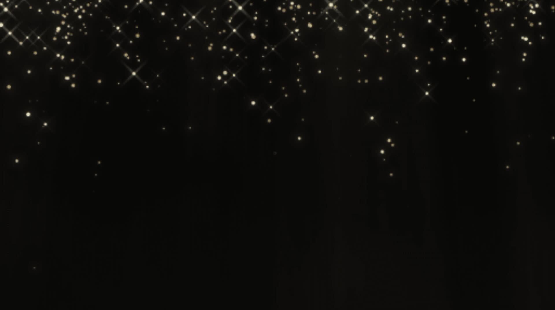 On Black Background Floating Golden Sparkles Glowing Particles