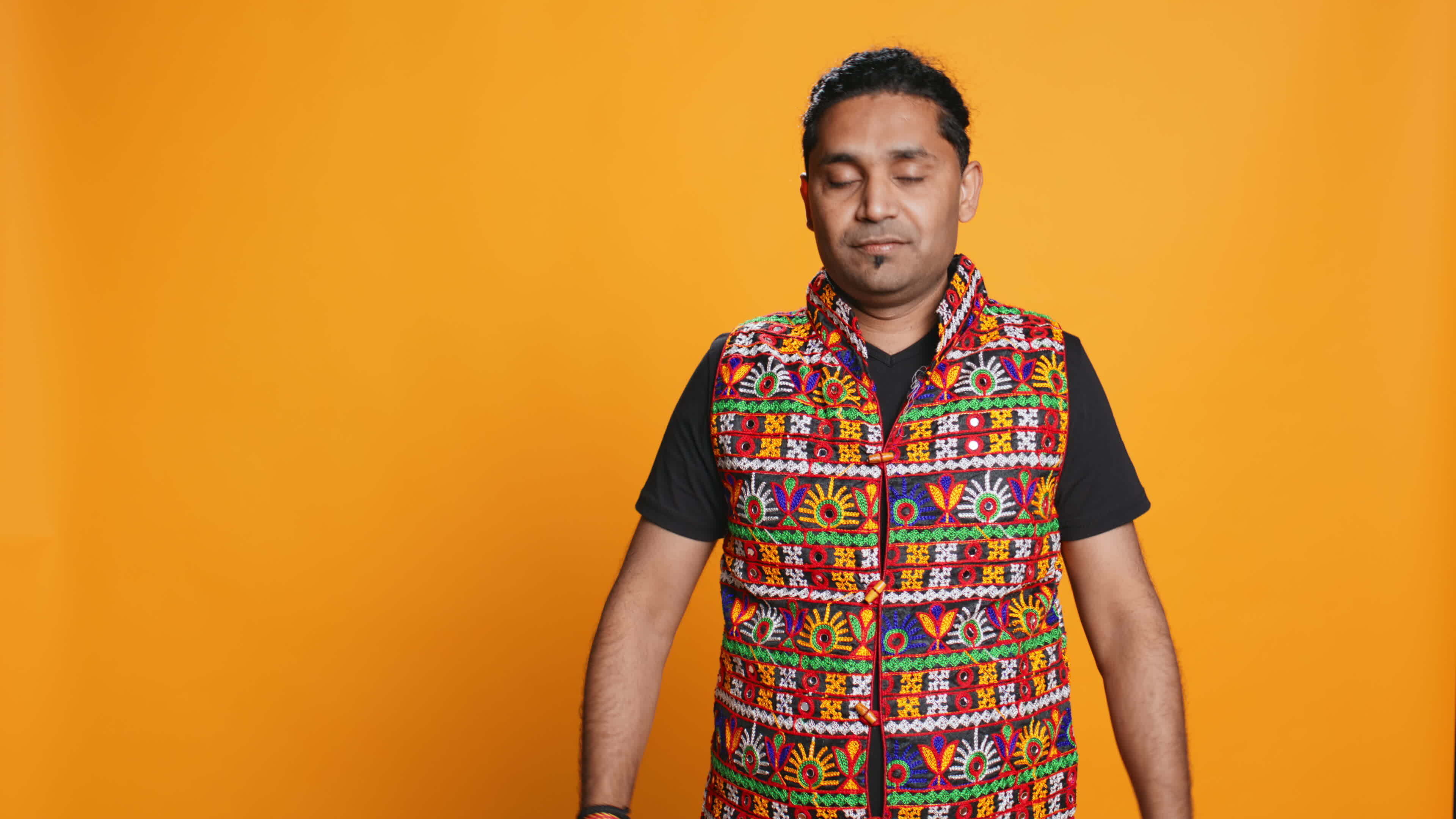 Indian man shrugging shoulders, unable to provide answer, having ...