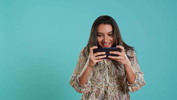 Indian Girl Using Phone Stock Video Footage For Free Download