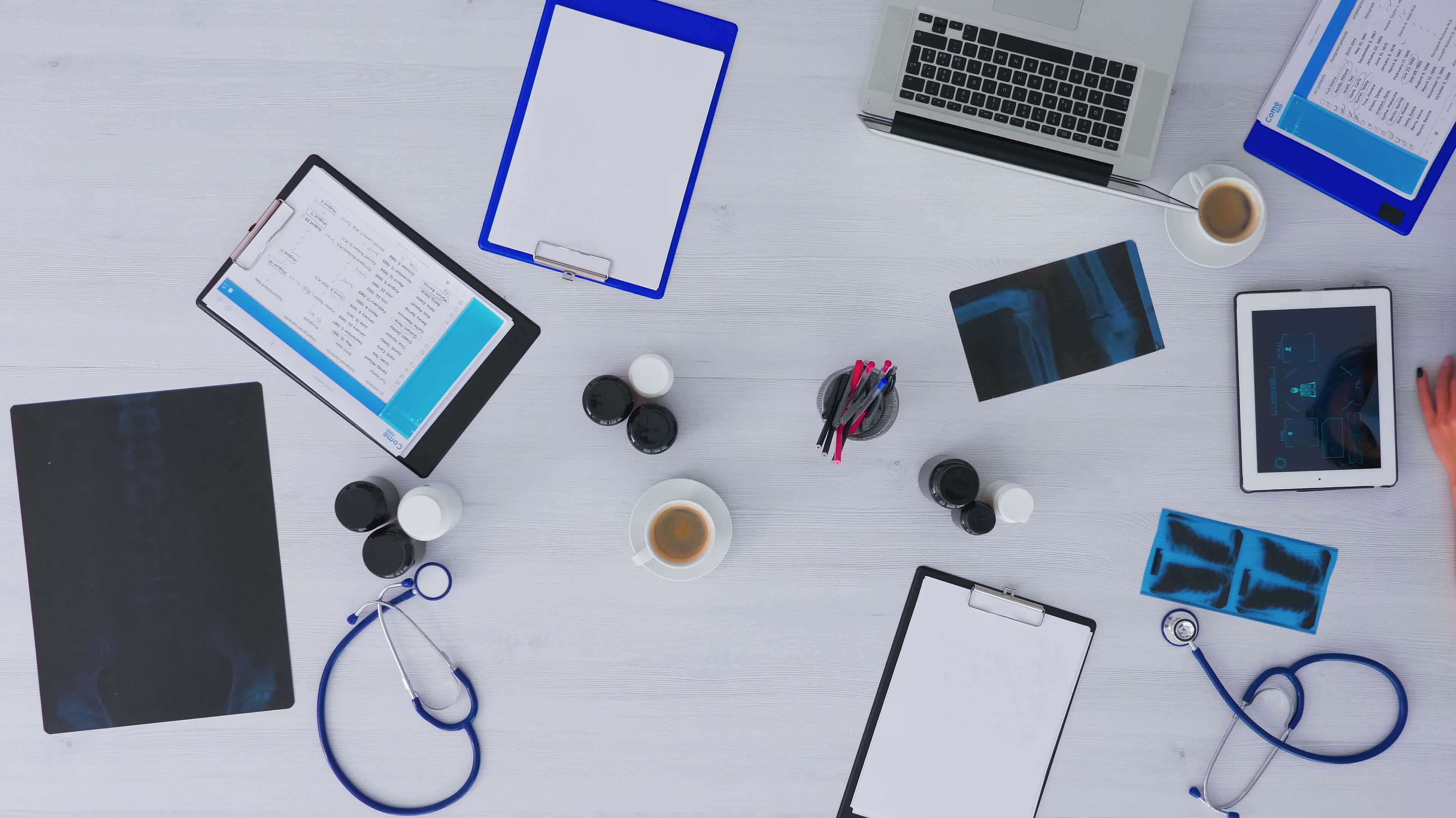 Top view of medical student learning using digital program on tablet ...