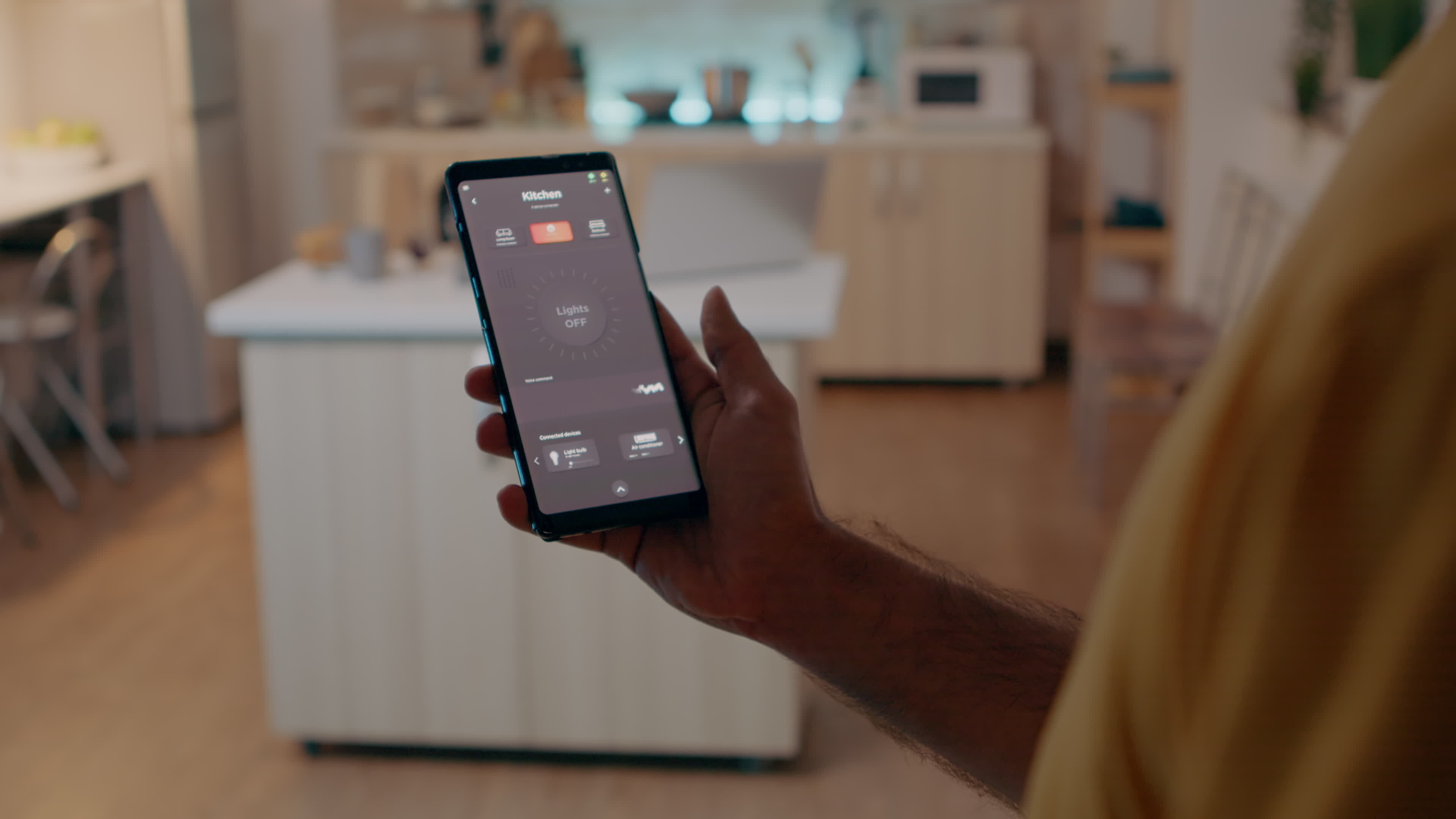 Man Turning On Bulbs In Smart House With Automation Lighting System Using Voice Activated