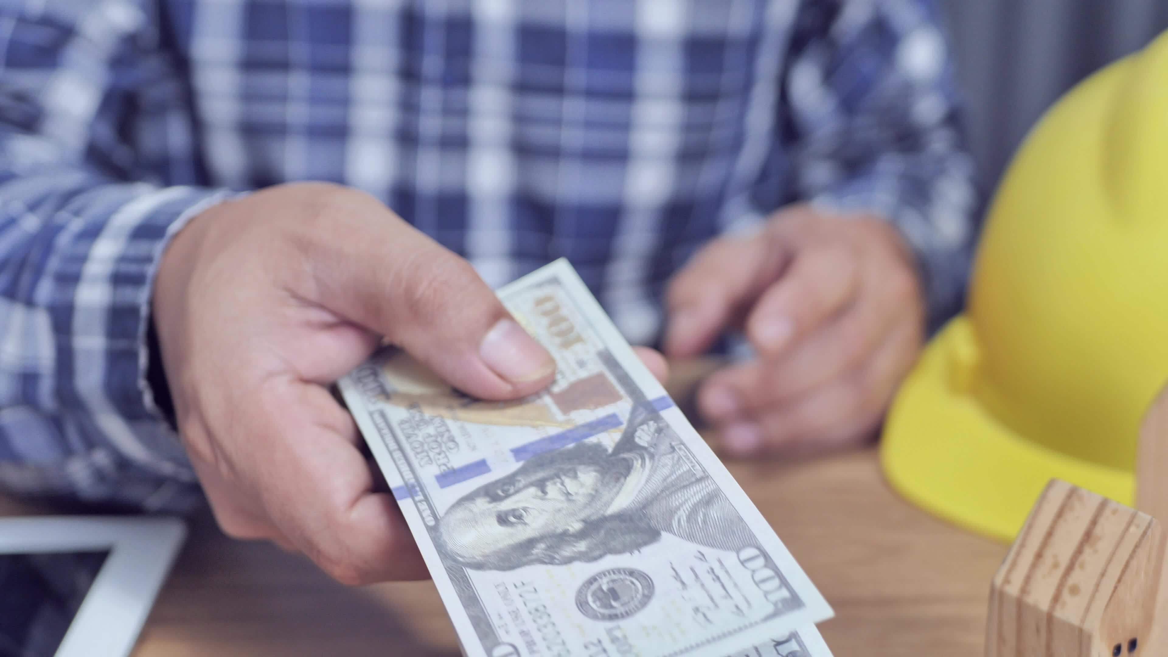 Male engineer counting dollars, work income concept 45365207 Stock ...