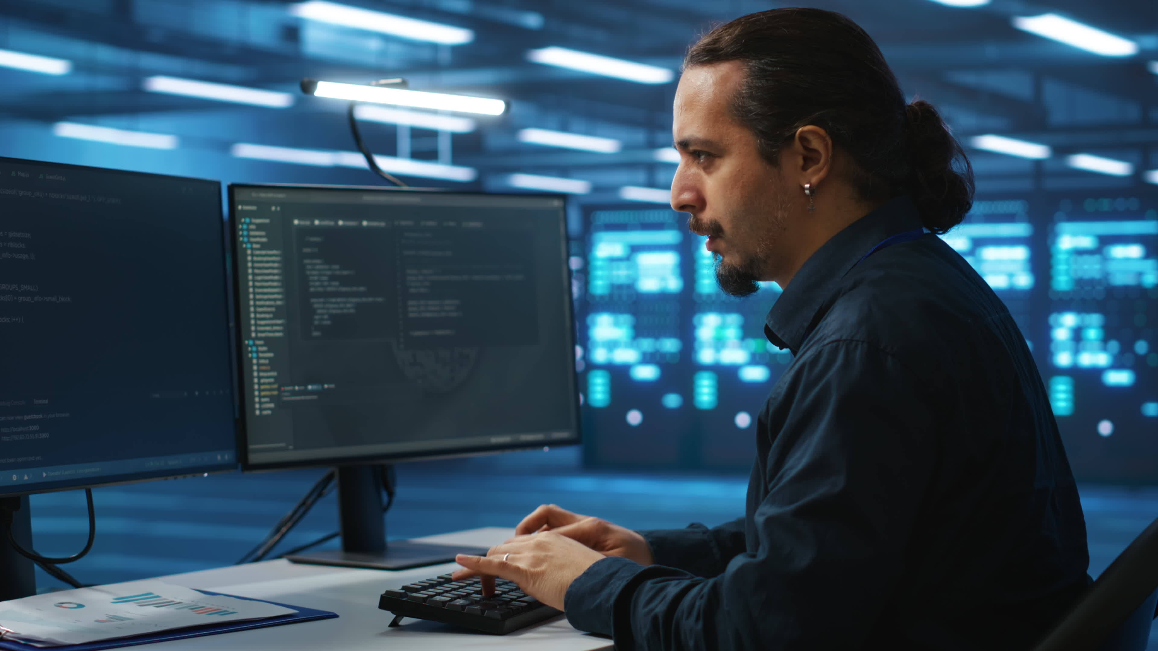 System Administrator Working In High Tech Server Room Capable Of