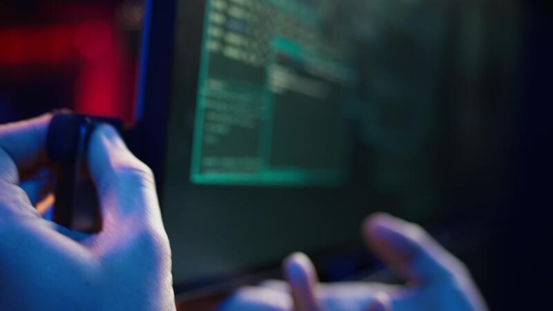Hacker Inserting Usb In Computer After Managing To Steal Sensitive Data