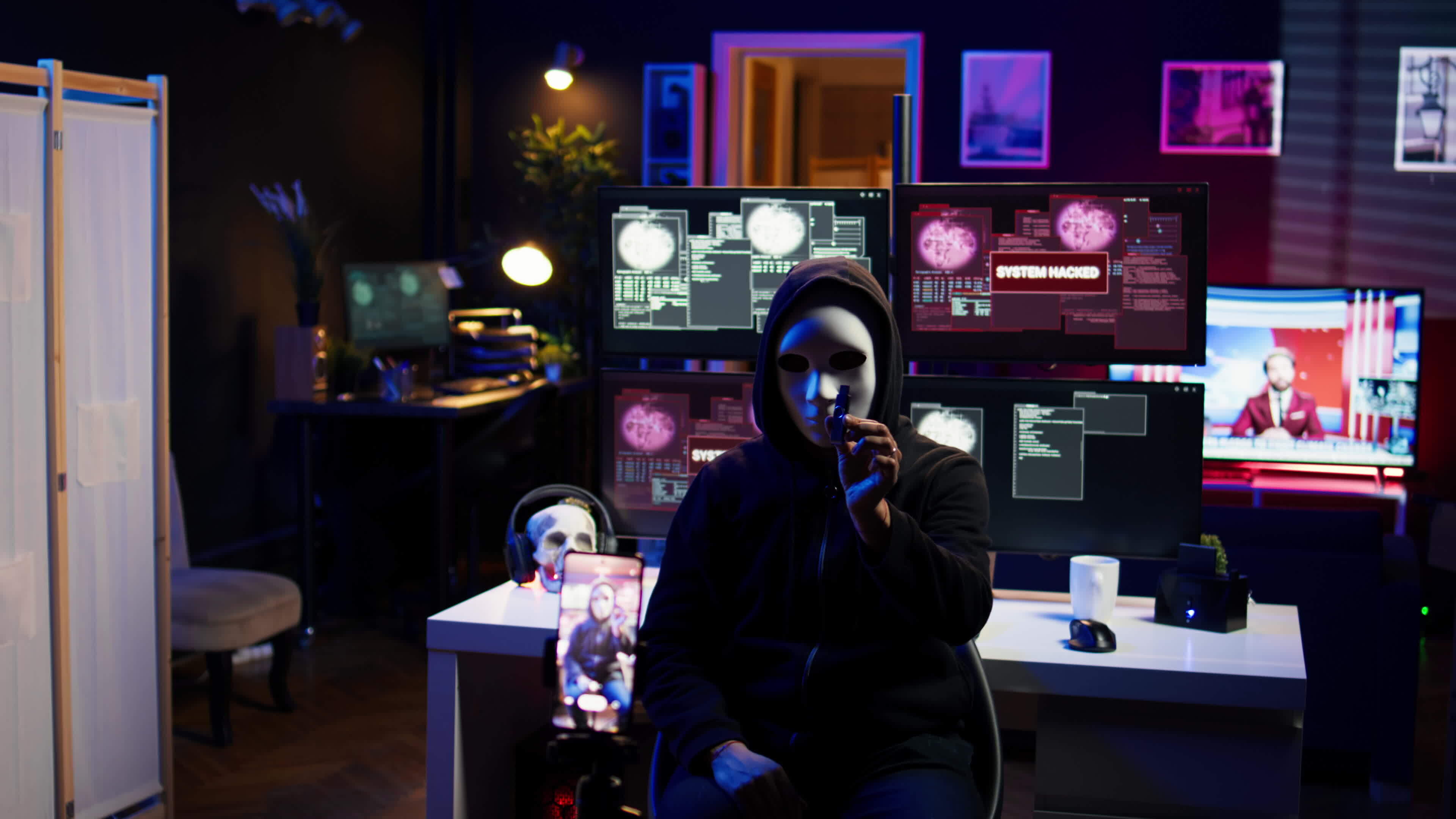 Evil programmer concealing identity using mobile phone to film ransom ...