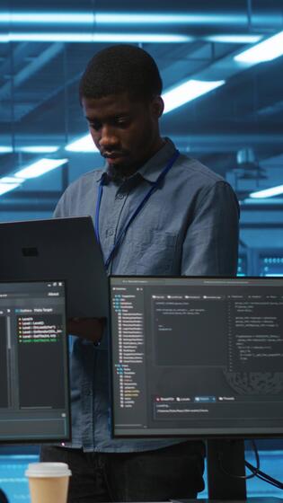 Vertical Manager Overseeing It Technicians In Server Hub Repairing Equipment Storing Datasets