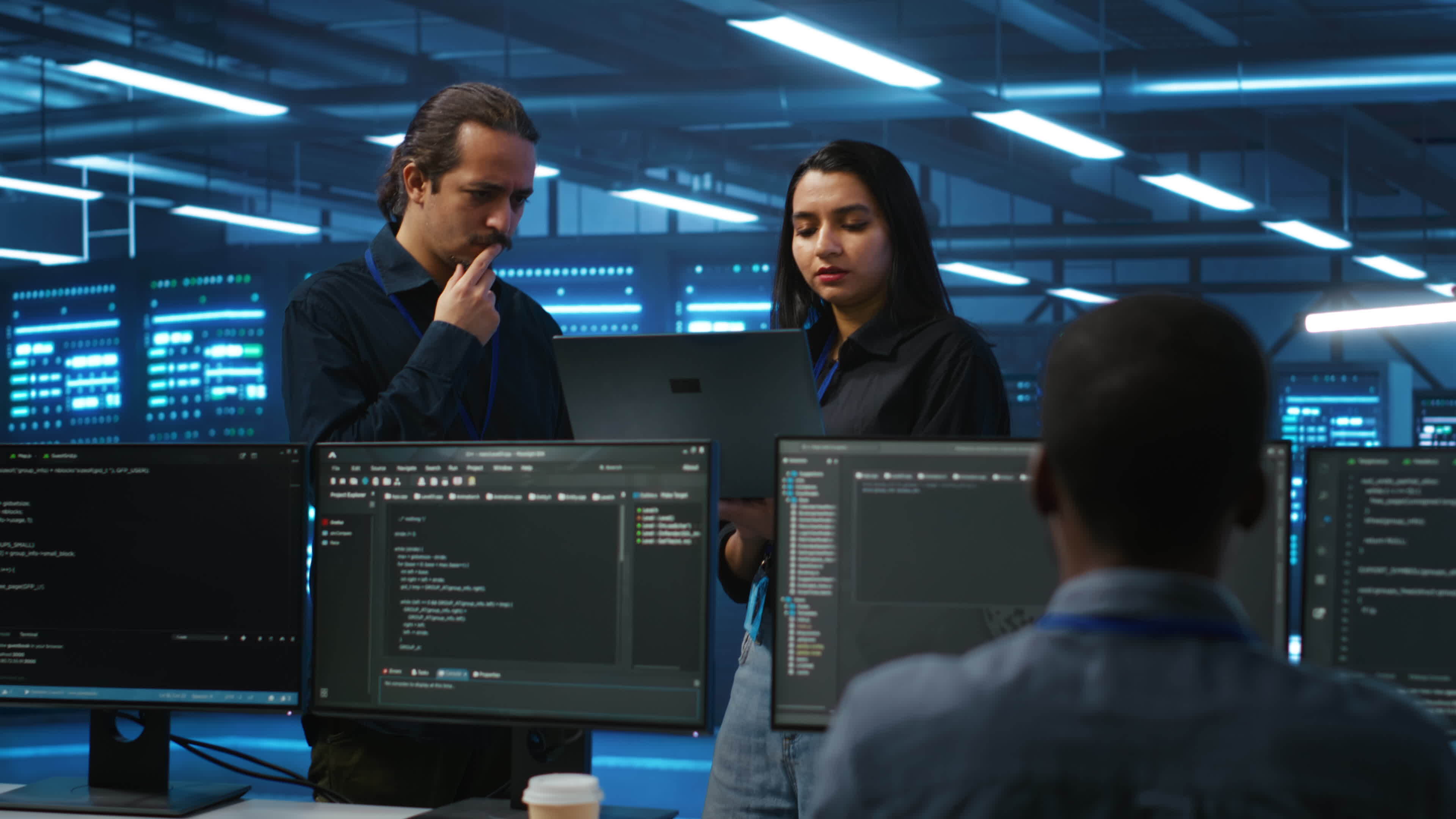 Multiethnic Engineering Team In Server Hub Monitoring Data Center