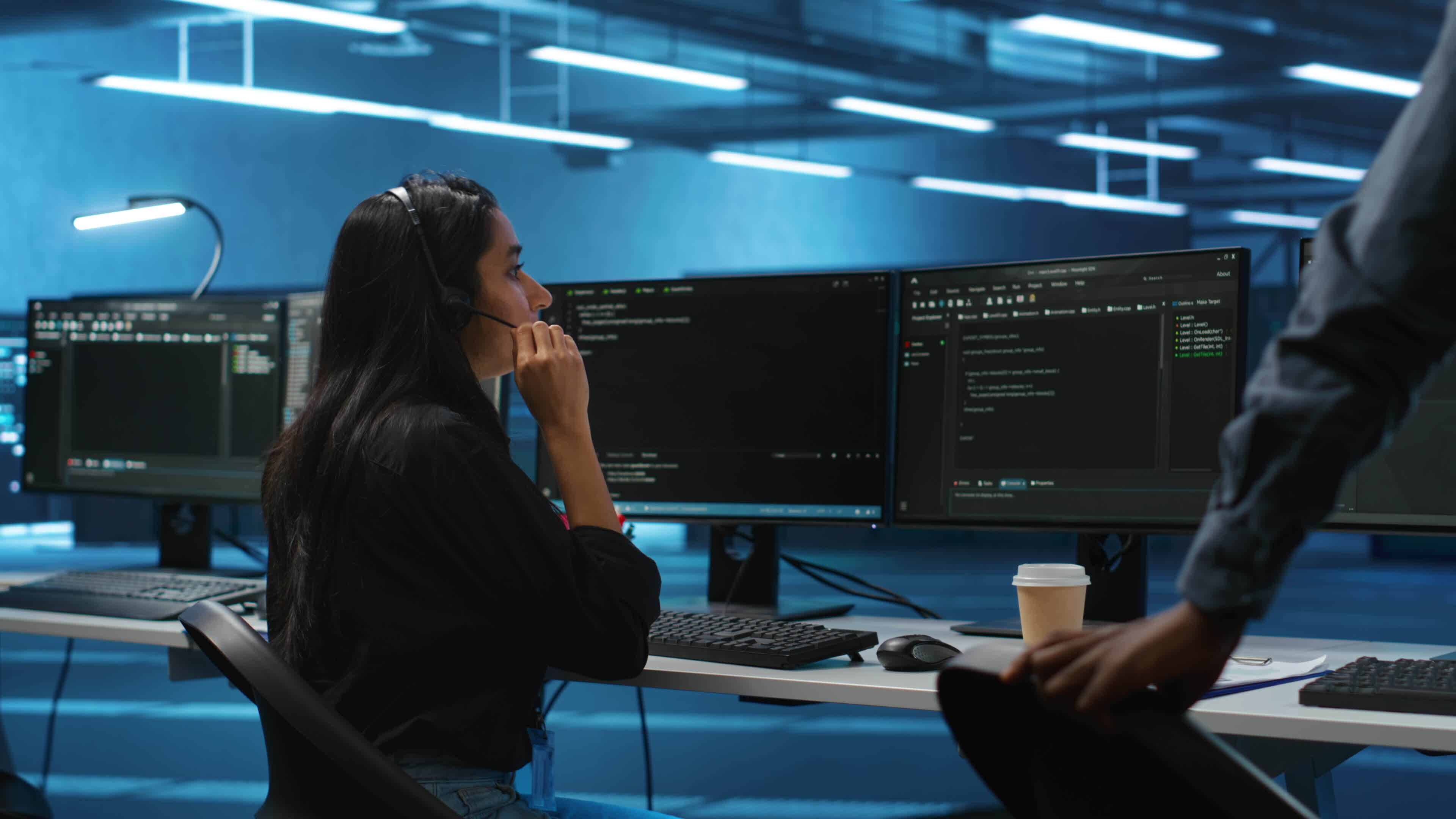Team Of It Support Experts Working Together Supervising Server Rows In