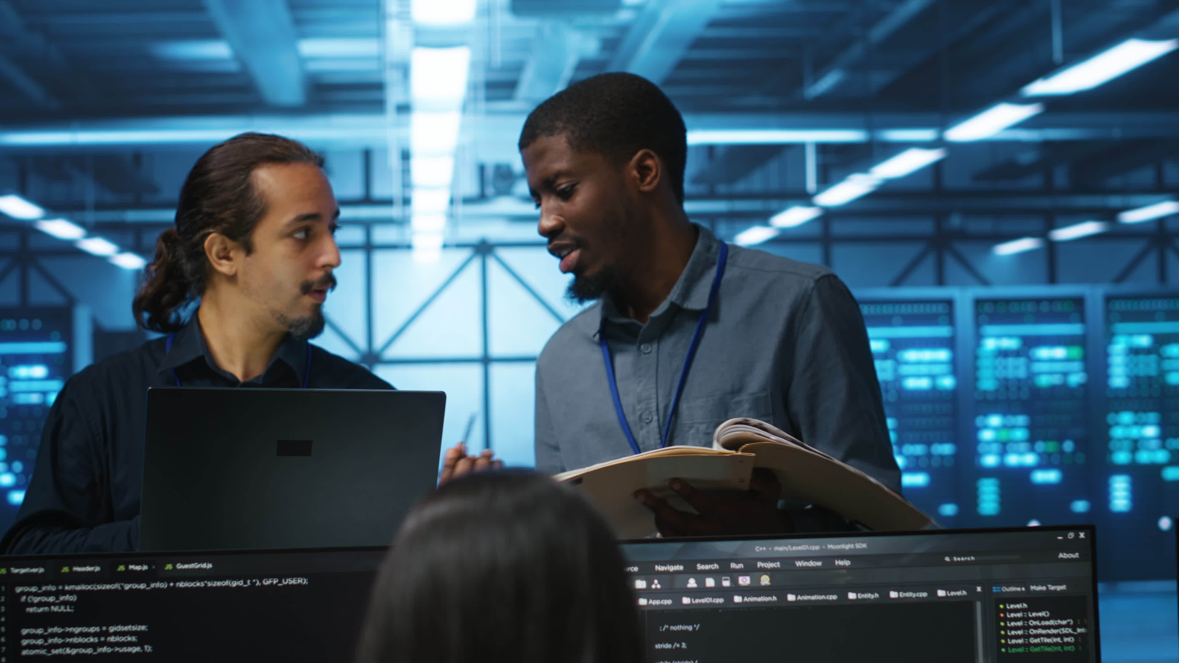African American Inspector Investigating Server Hub Reading Paperwork