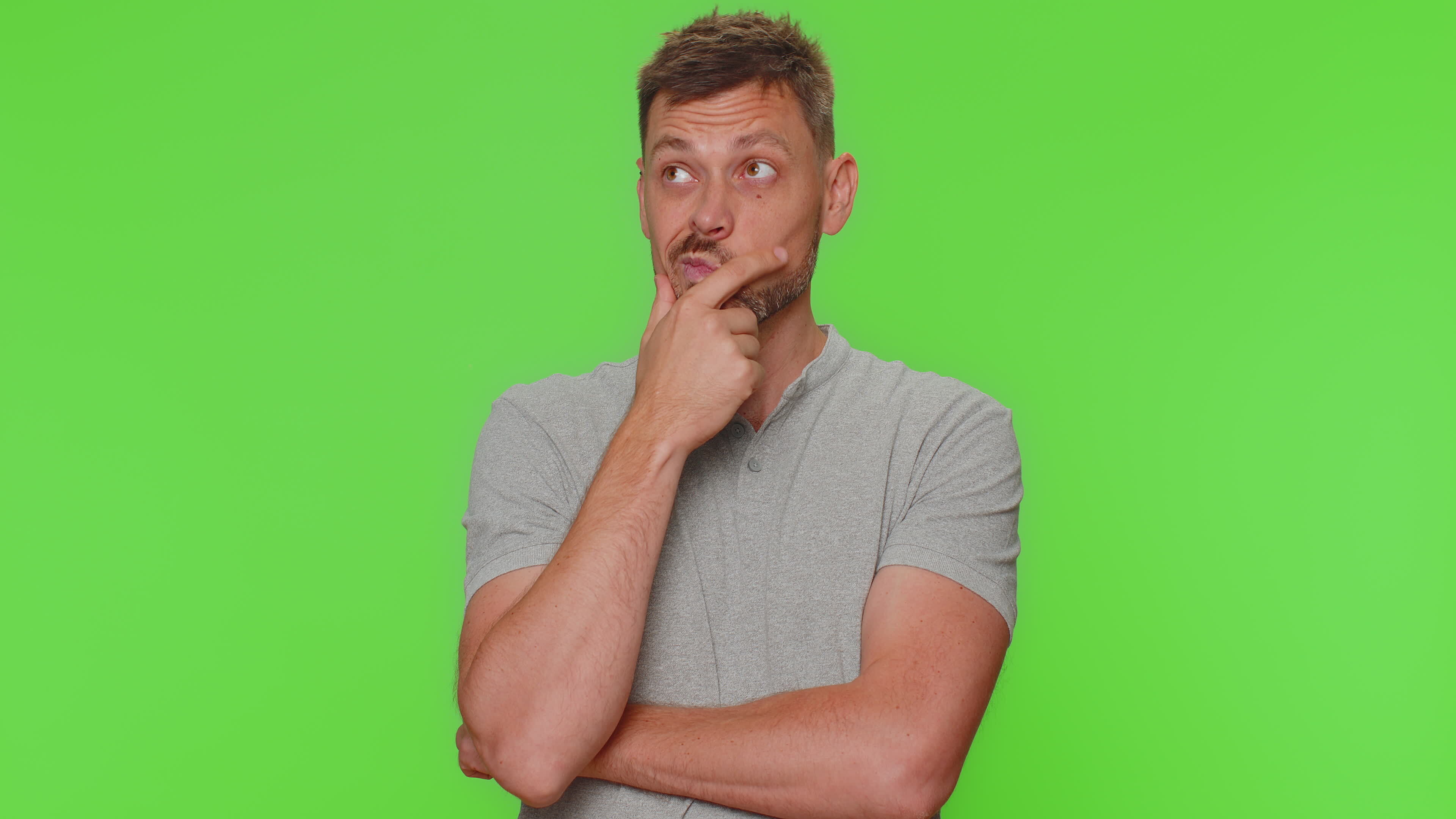 Inspired man pointing finger up with open mouth, having good idea, plan ...