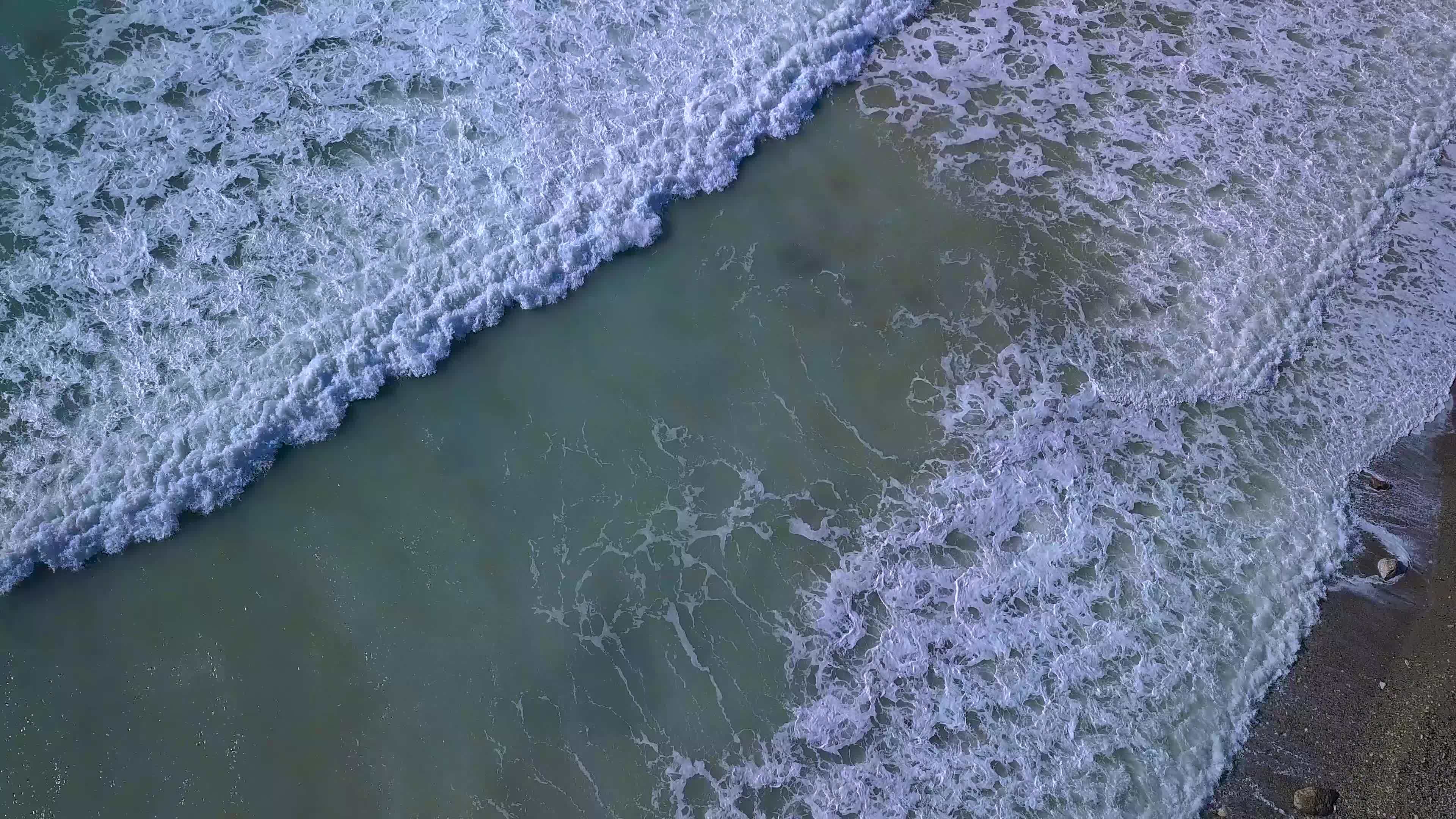 Aerial top view waves break on beach. Sea waves on the beautiful beach ...