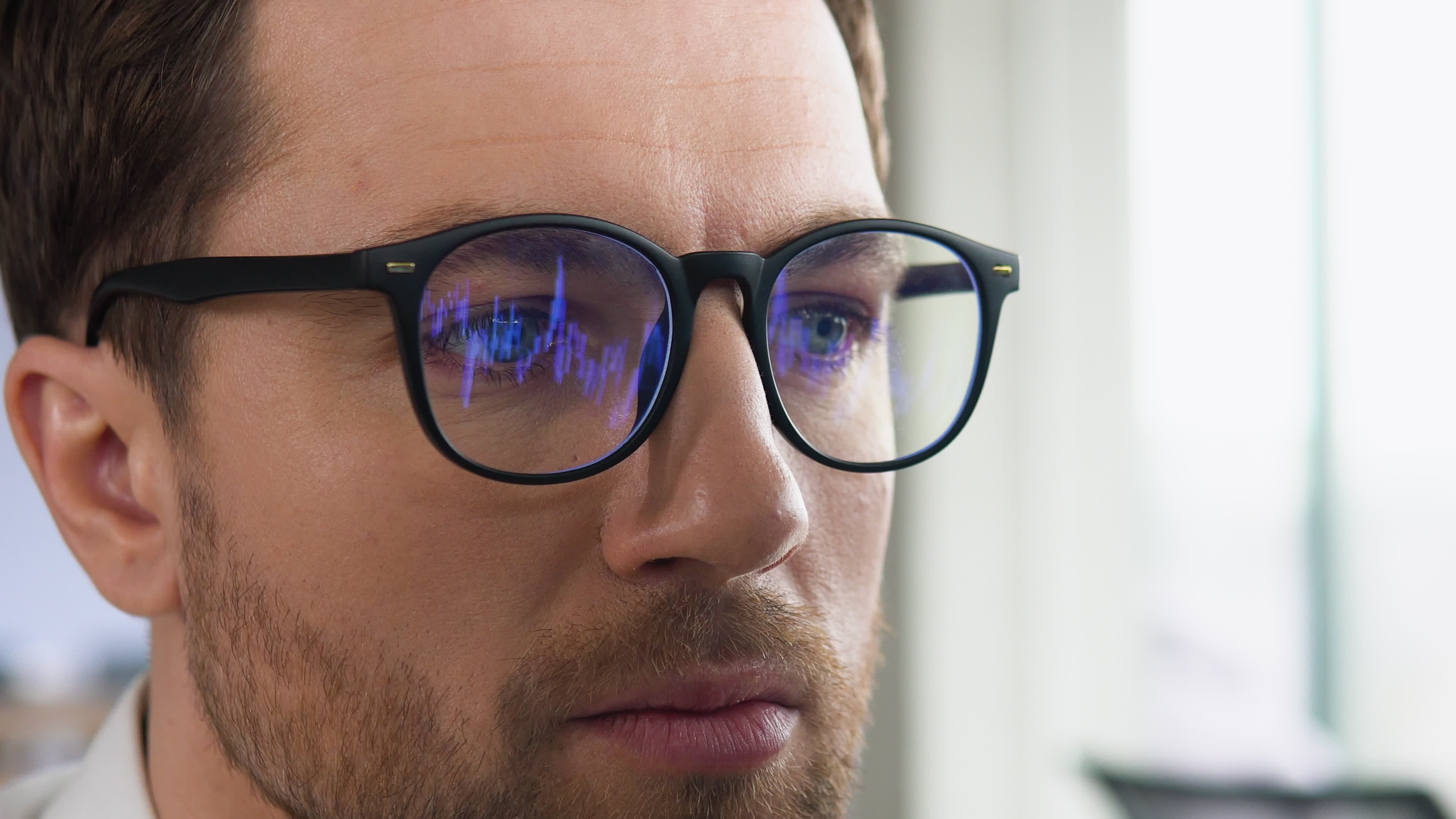 Crypto Trader Wearing Eyeglasses Working Looking At Computer Screen Reflecting In Glasses