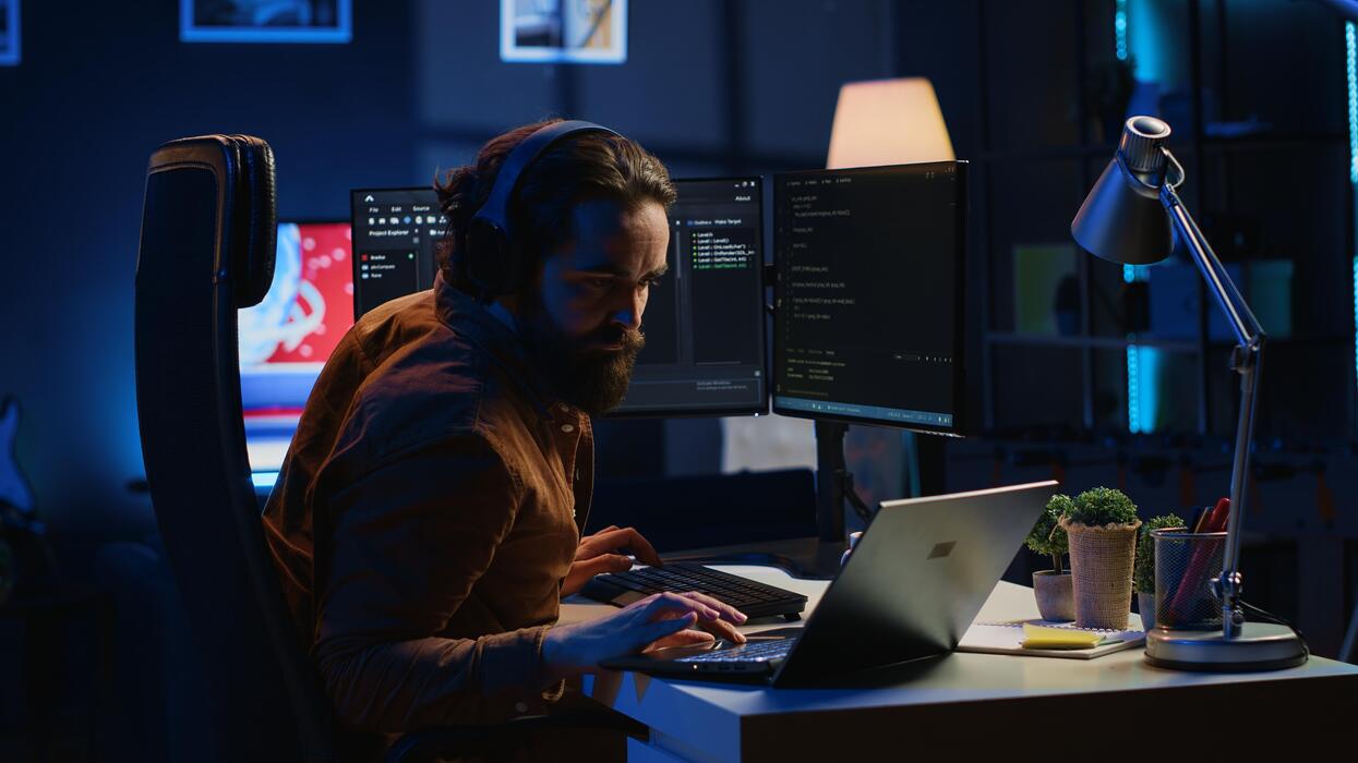 Programmer Working Stock Photos, Images and Backgrounds for Free Download