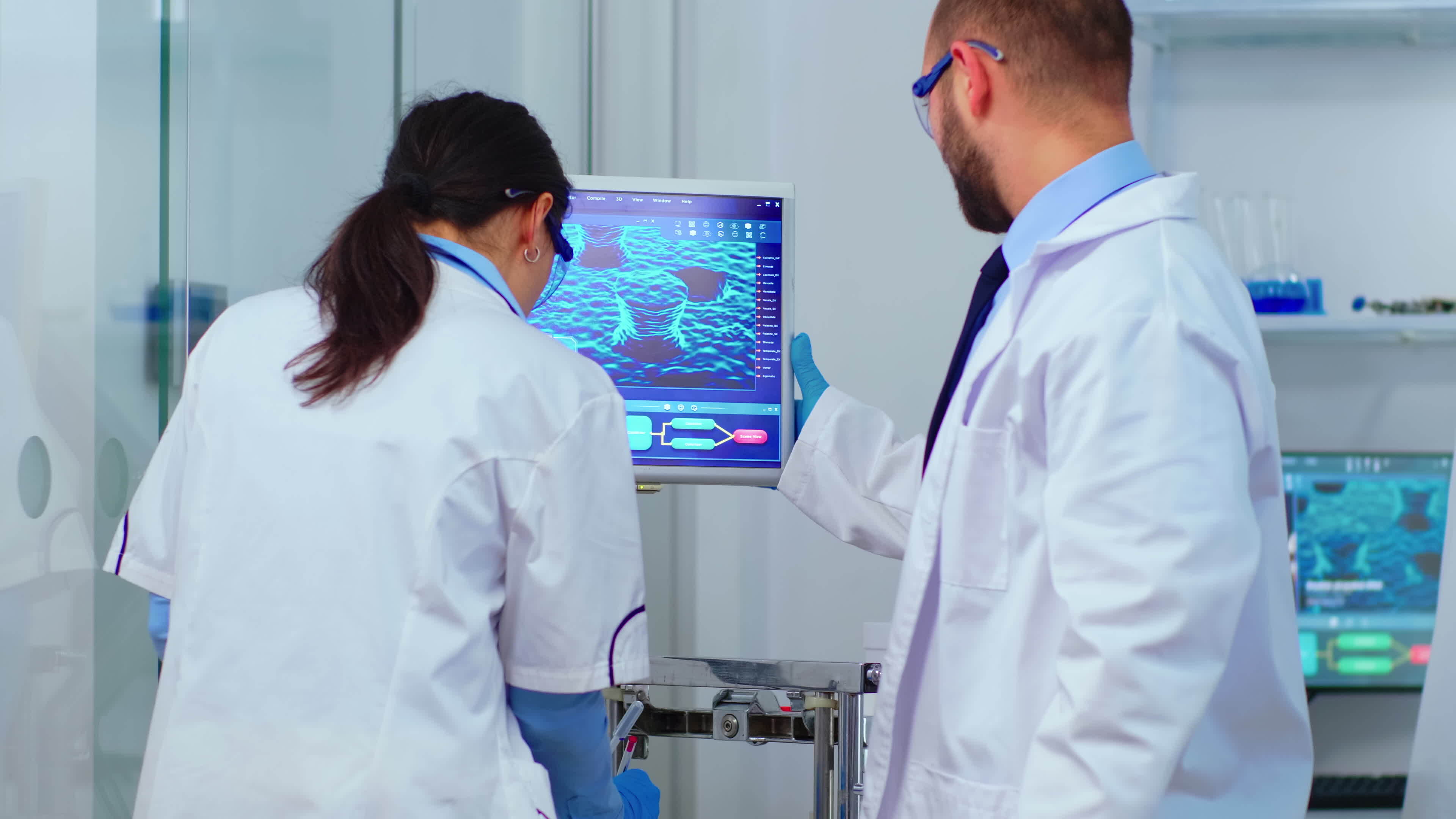 Scientist Team Arguing In Front Of Computer Looking At Virus