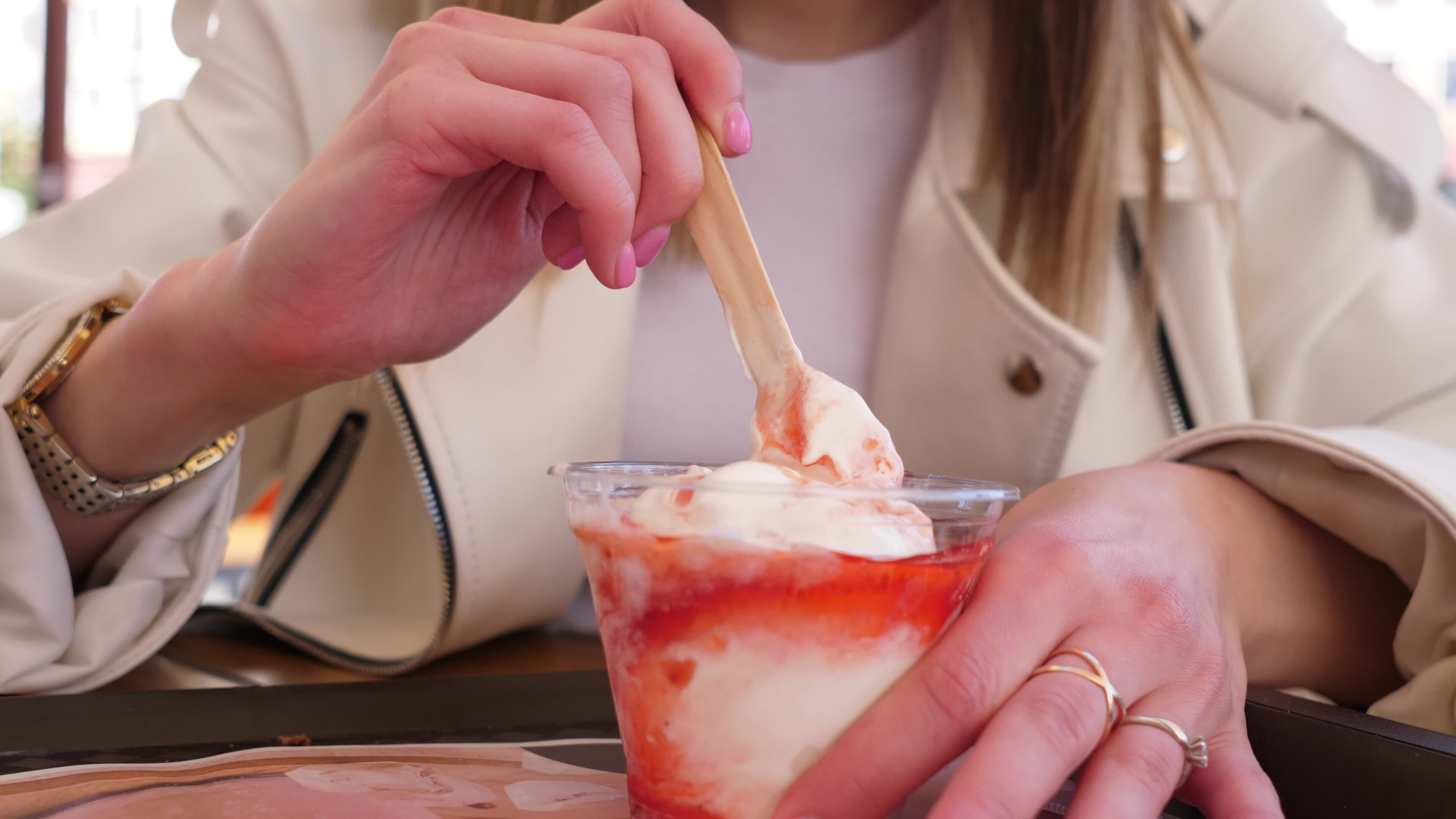 ice cream hands close 4k 46550073 Stock Video at Vecteezy