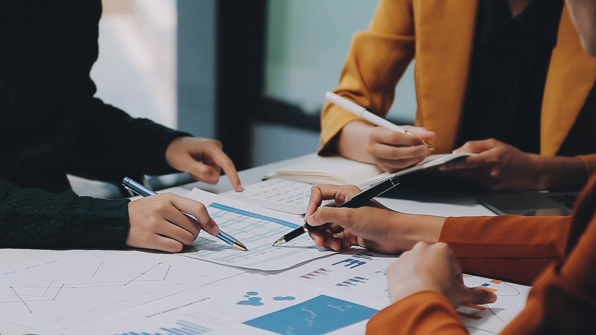 Young Asian Woman Leading Business Creative Team In Mobile Application Software Design Project