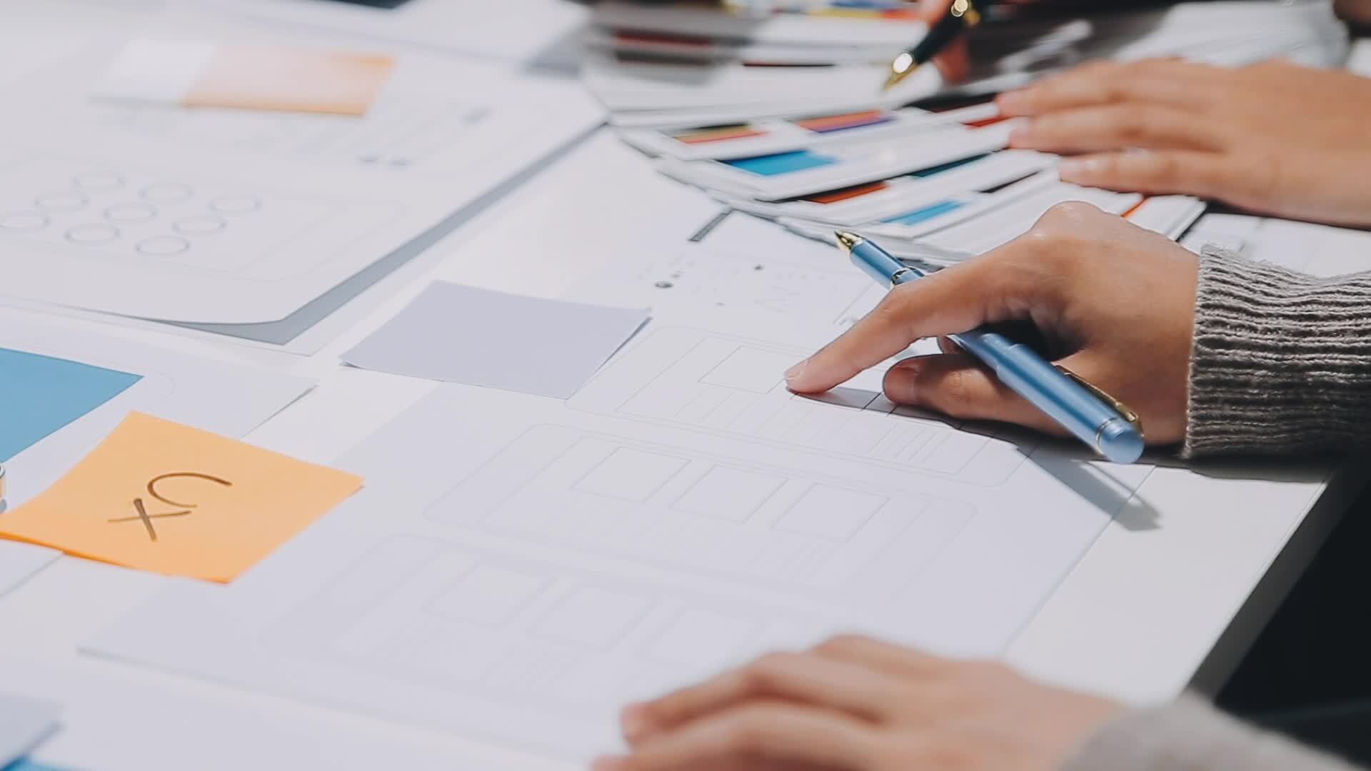 Young Asian Woman Leading Business Creative Team In Mobile Application Software Design Project