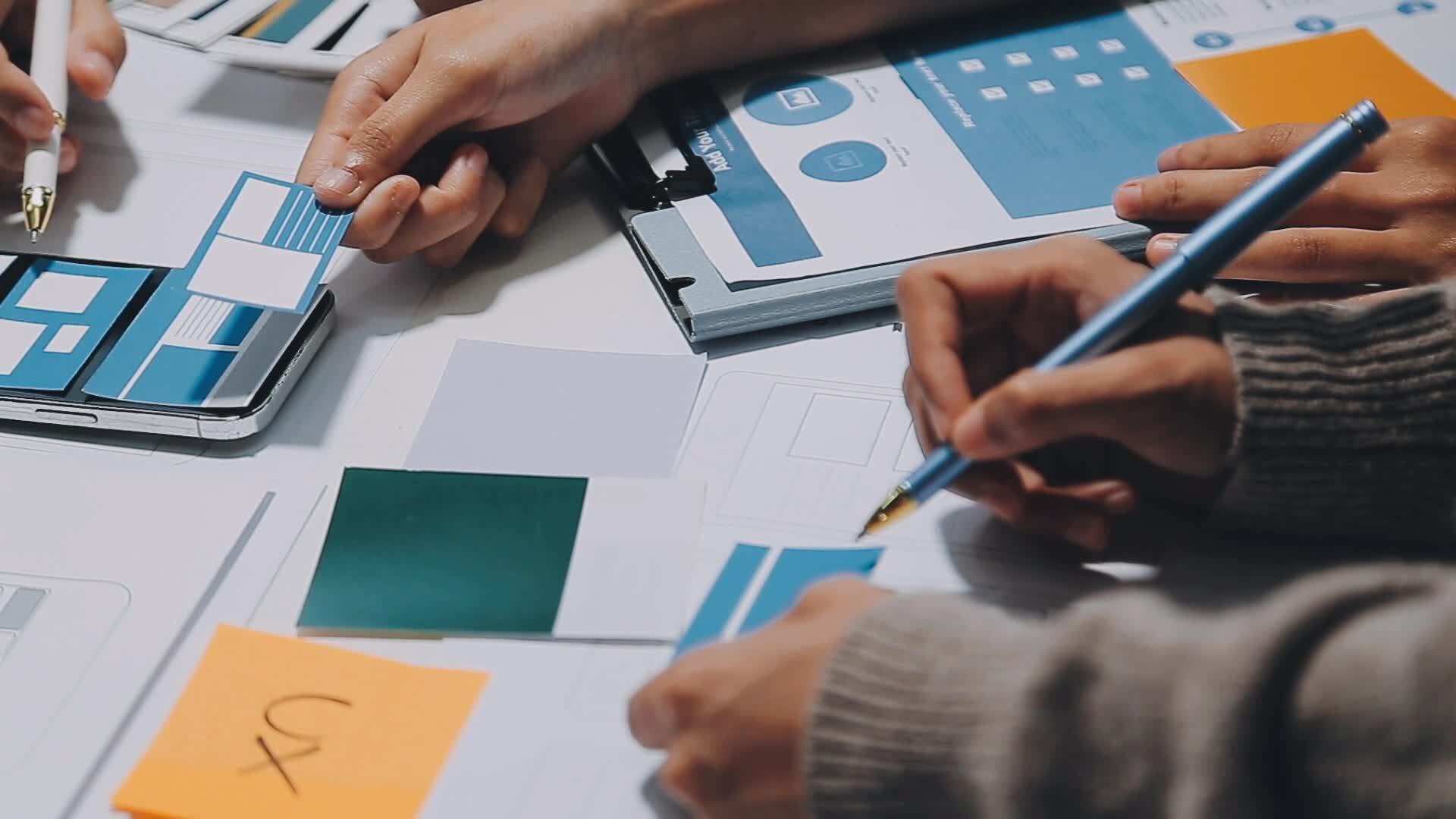 Young Asian Woman Leading Business Creative Team In Mobile Application Software Design Project