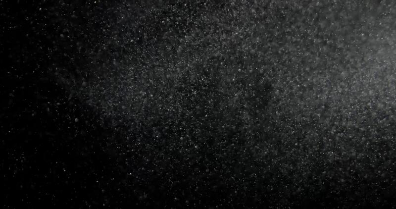 Organic dust particles on black screen overlay. Filmed with RED camera in slow motion. Abstract ...