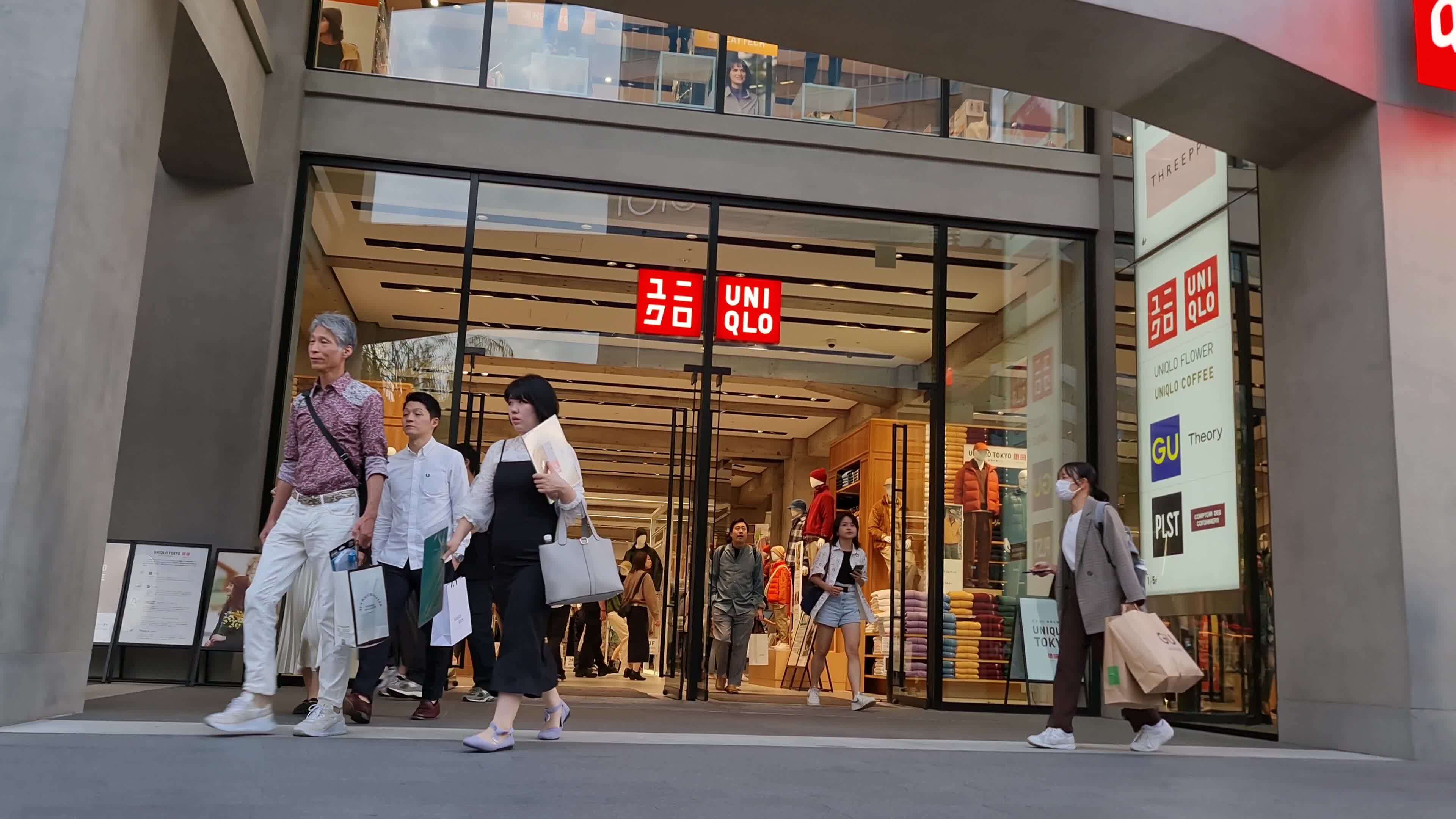 Tokyo, Japan on October 3, 2023. People are walking in front of the Uniqlo Shibuya store ...