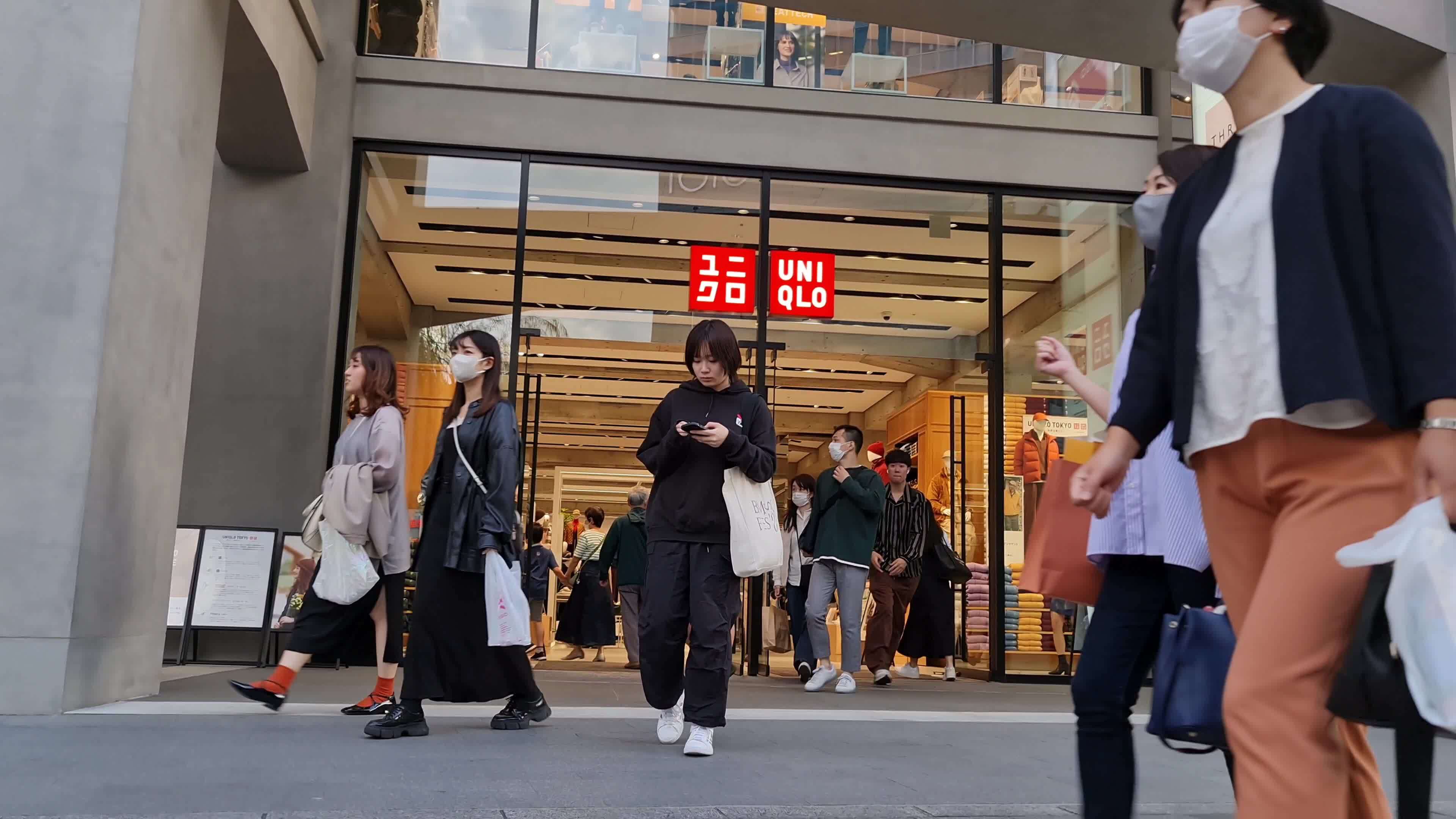 Tokyo, Japan on October 3, 2023. People are walking in front of the Uniqlo Shibuya store ...