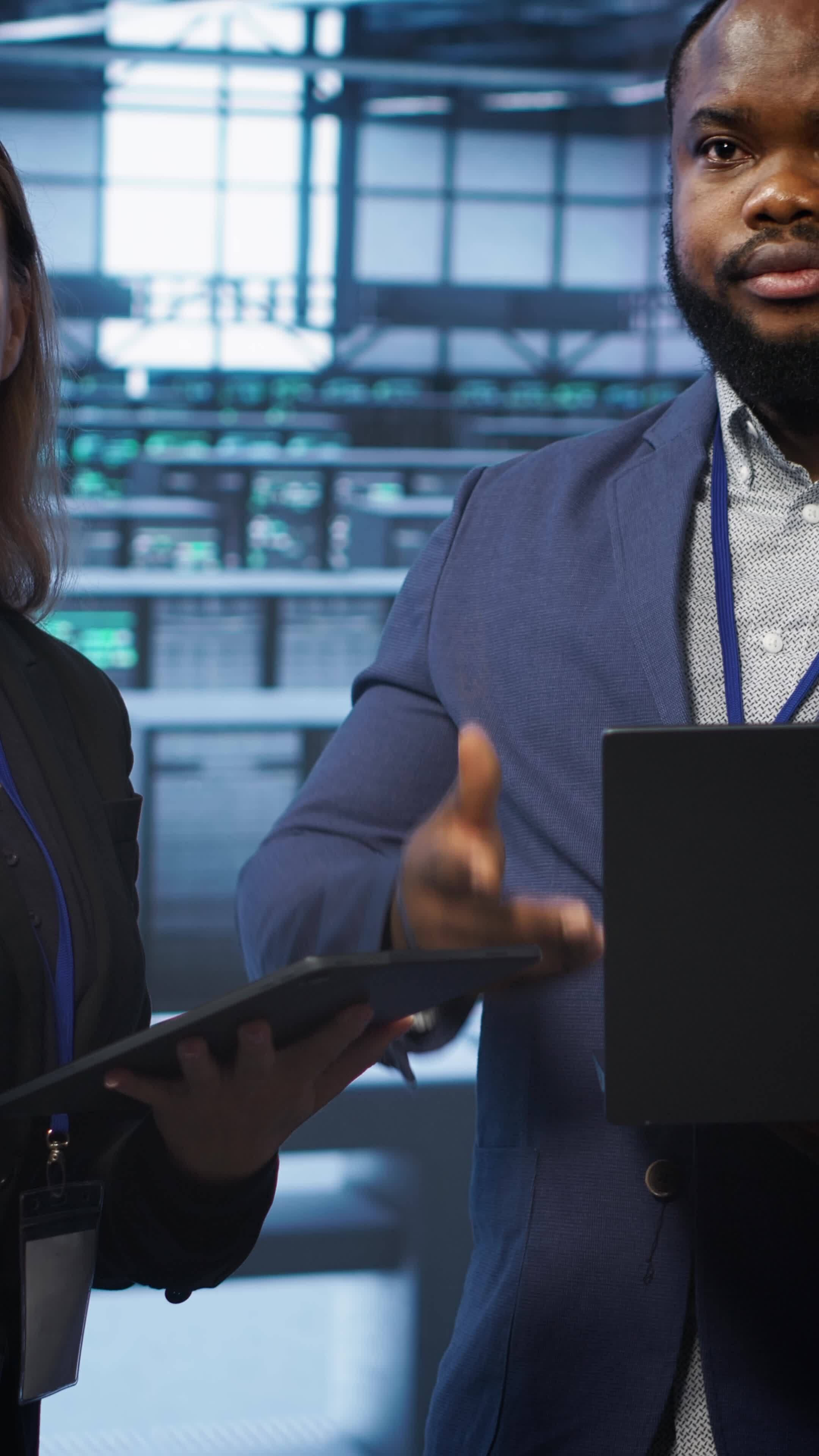 Vertical Teamworking Colleagues Doing Checkup Inputting Data On Laptop Of Needed Server Hub