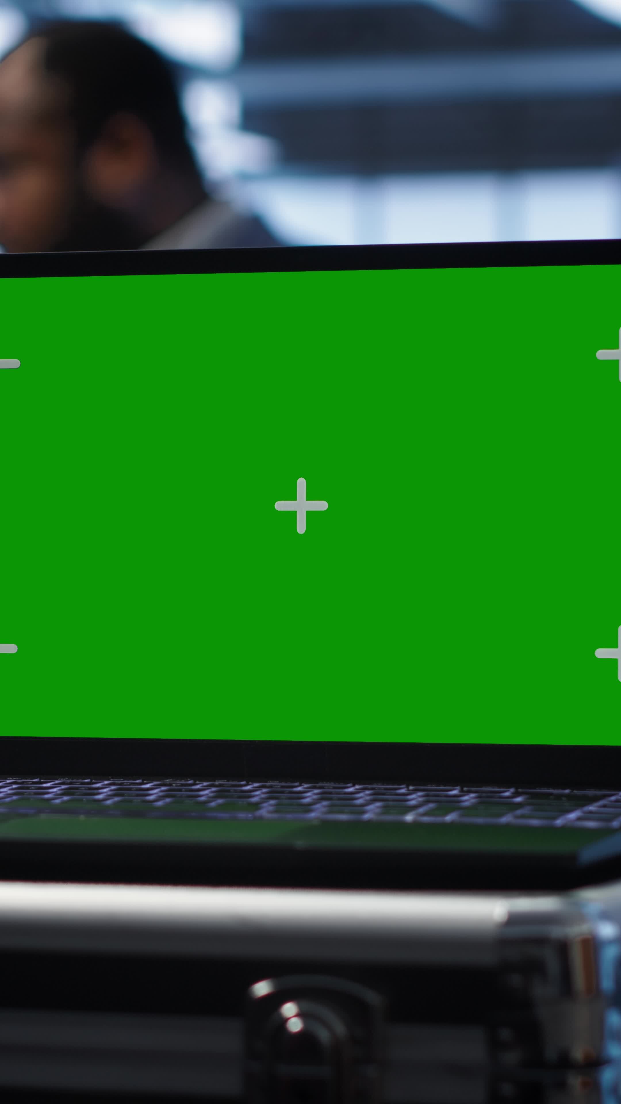 Vertical Isolated screen laptop in data center running error checking software monitoring ...